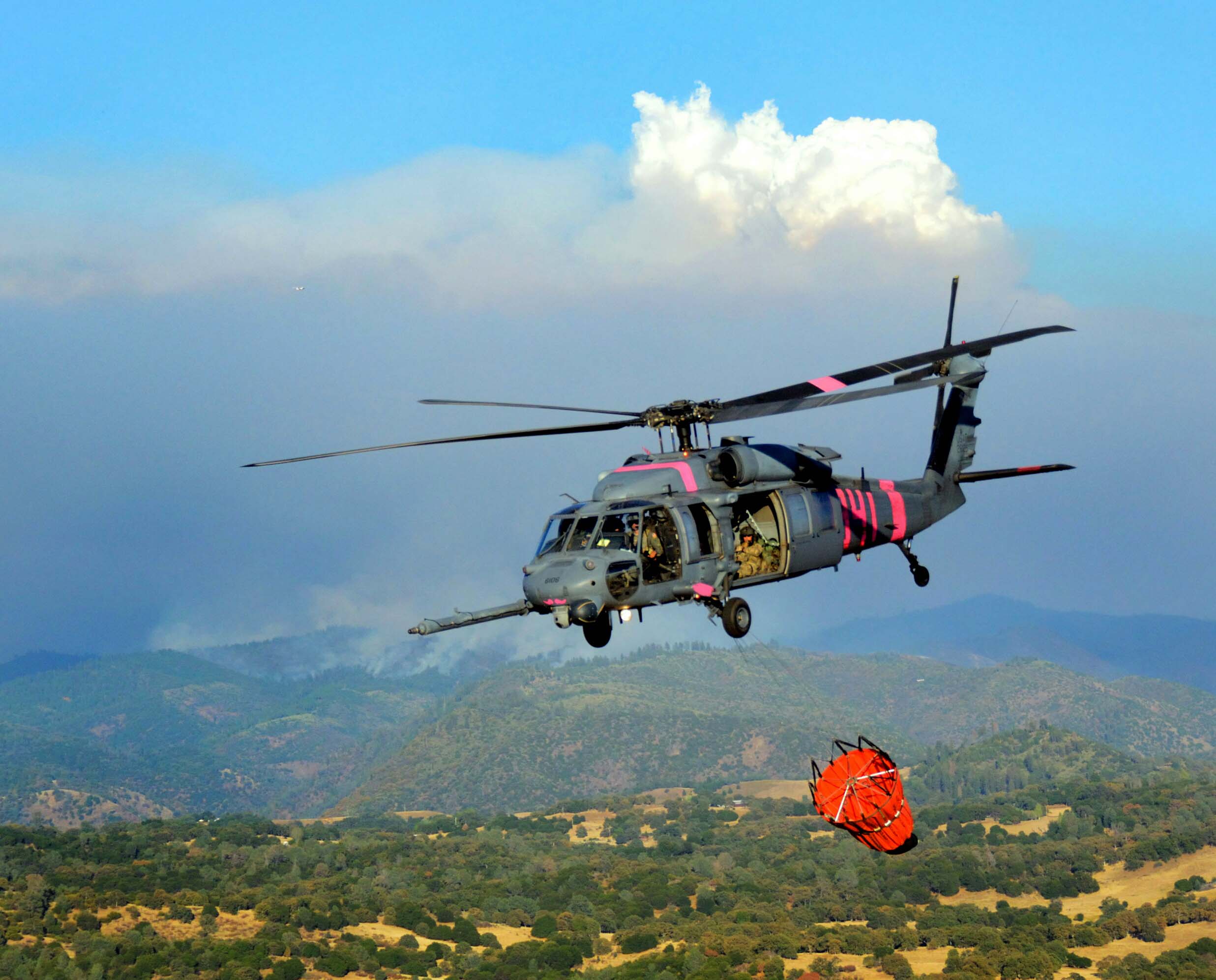 Airmen help fight the Rim fire near Yosemite National Park, Calif., Aug ...