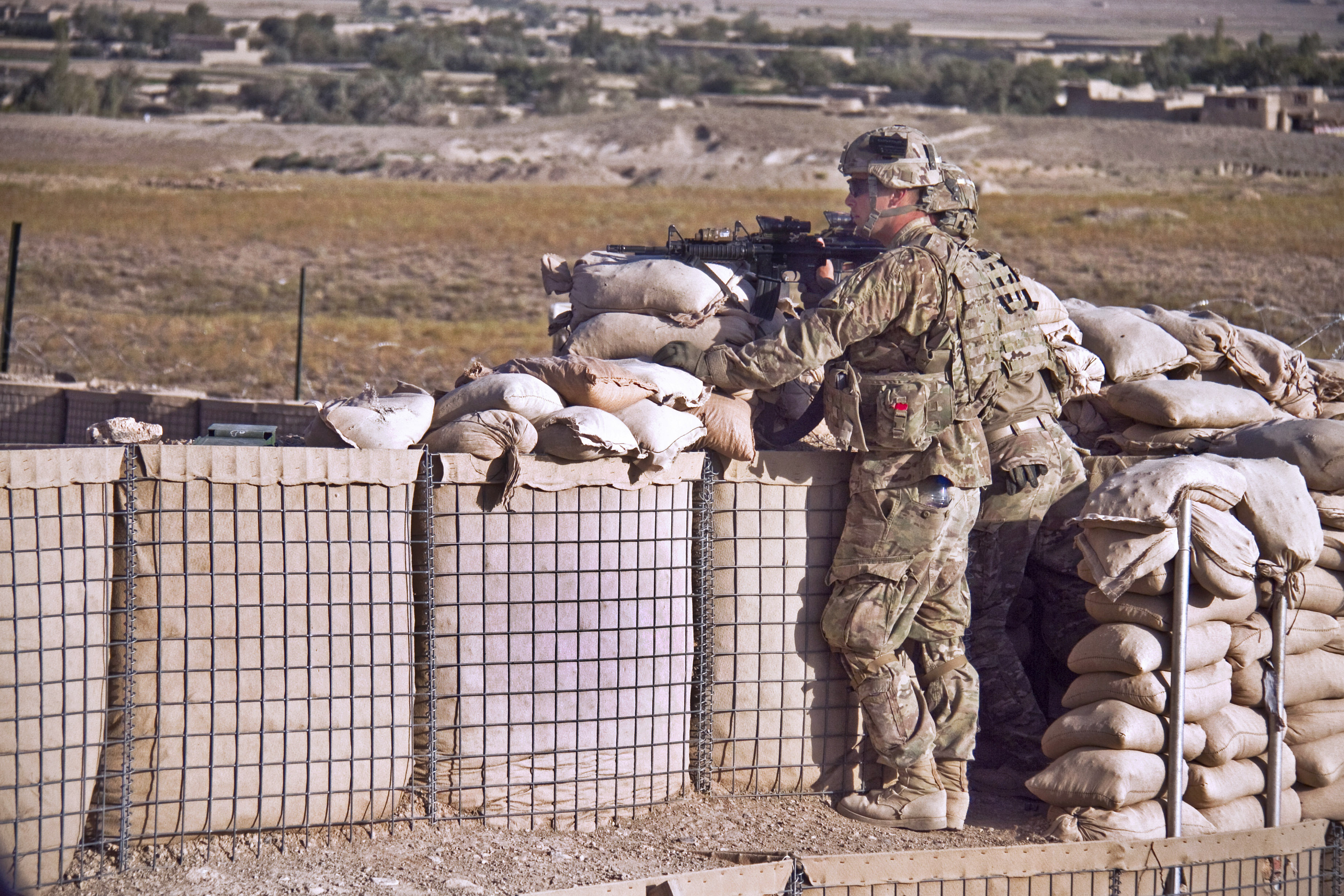U.S. soldiers provide security on Combat Outpost Kaligu in Afghanistan ...