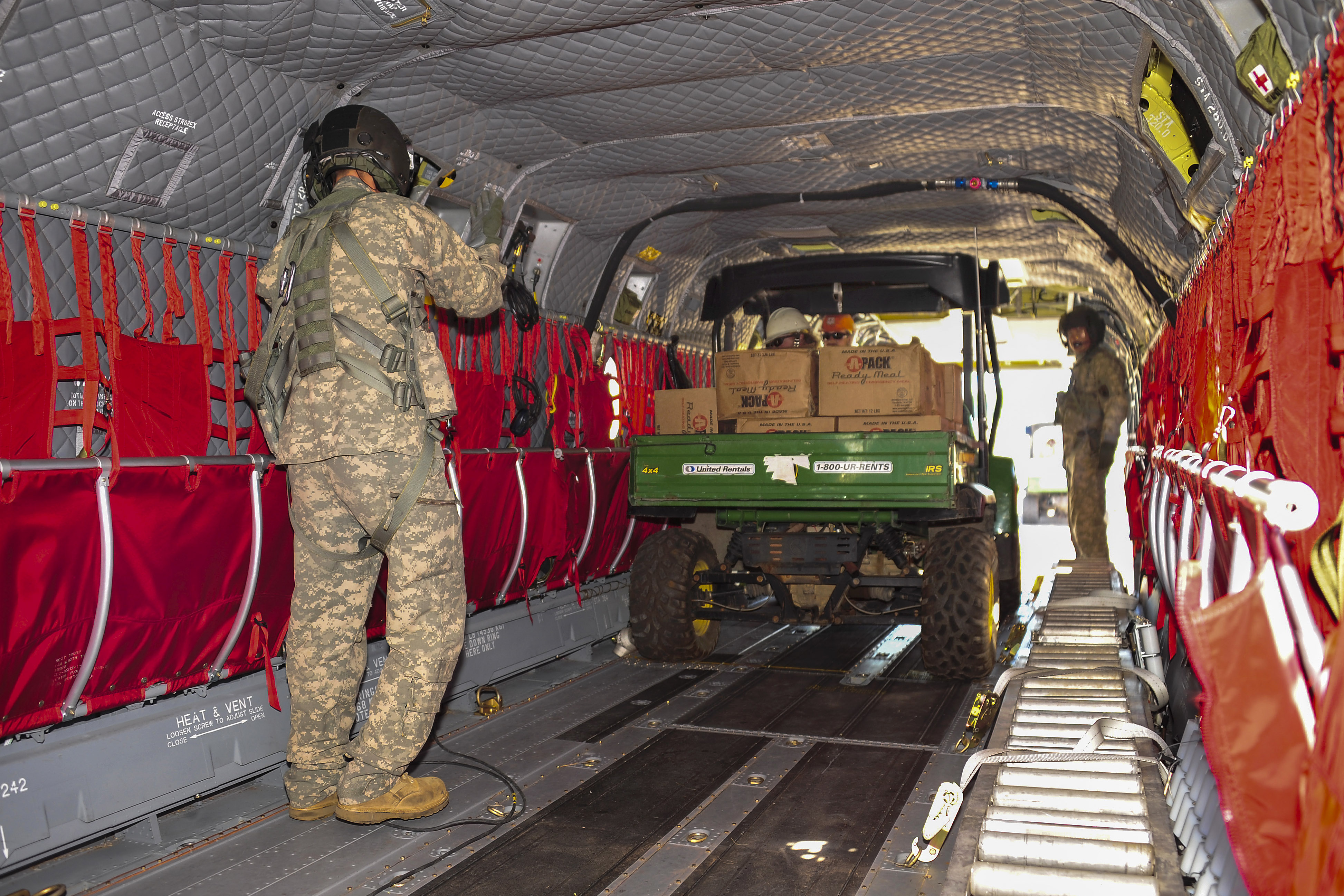 Army Pvt. Ben Stocker, left, and Army Staff Sgt. Guy Morgan guide and ...