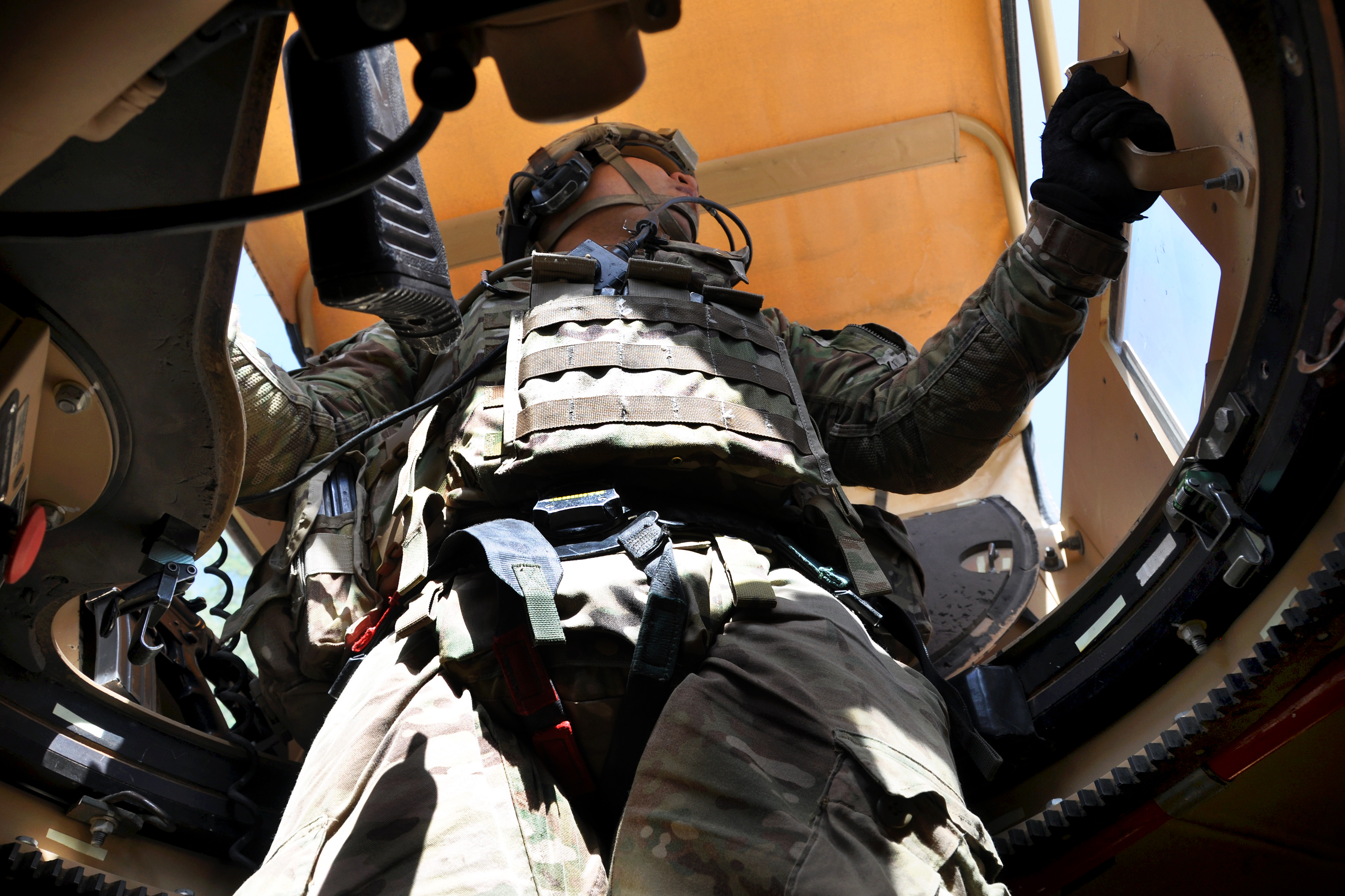U.S. Army Spc. Alik William mans the M240 mounted machine gun on an ...
