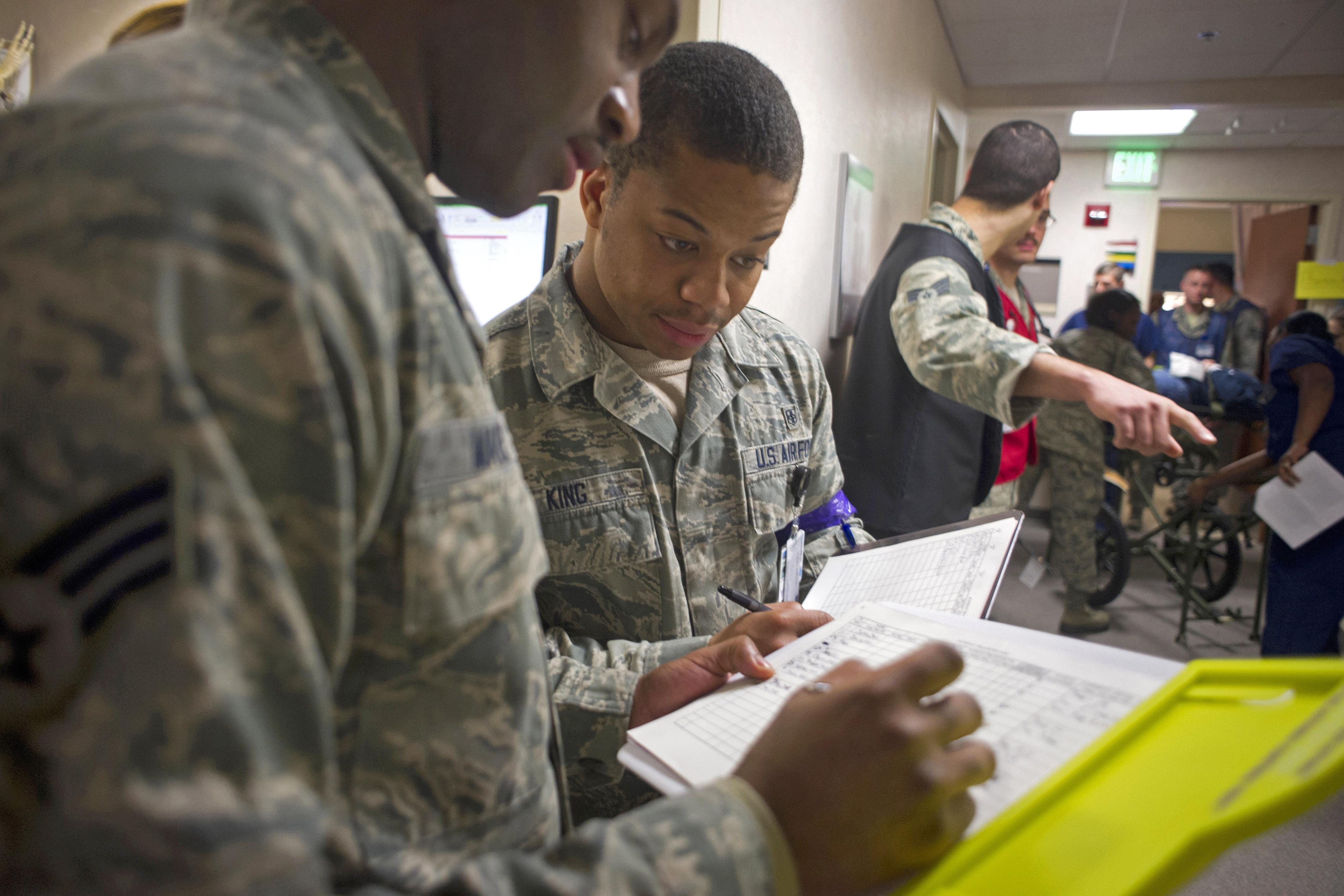 Air Force Senior Airman Broderick Maxie, left, and Air Force Airman 1st ...