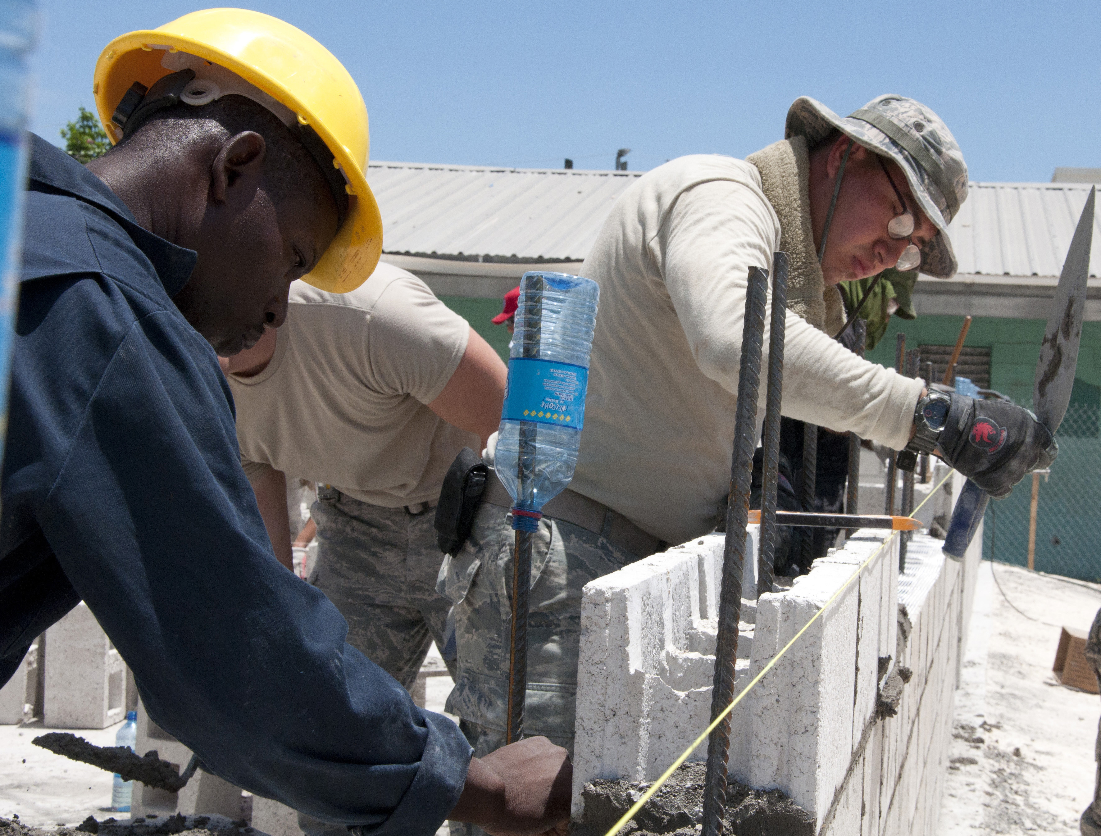 U.S. Air Force Senior Airman Eric Barahona and Belize Pvt. Chester Arzu ...