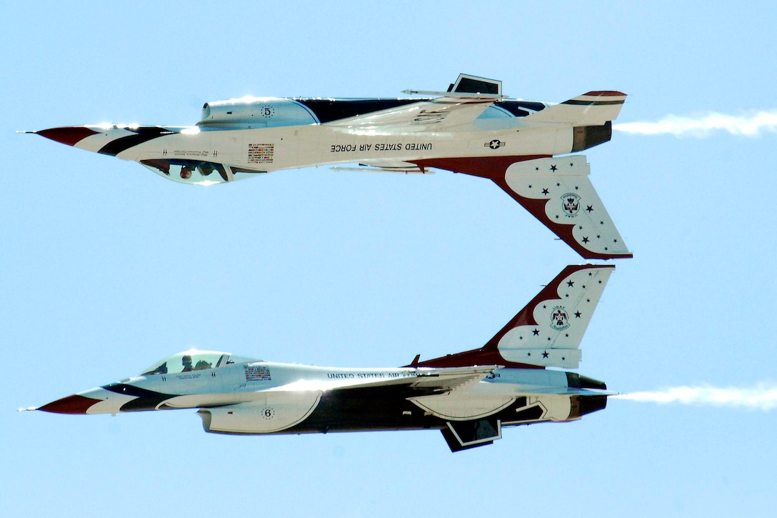 Two U.S. Air Force Thunderbirds perform an inverted formation fly-by ...