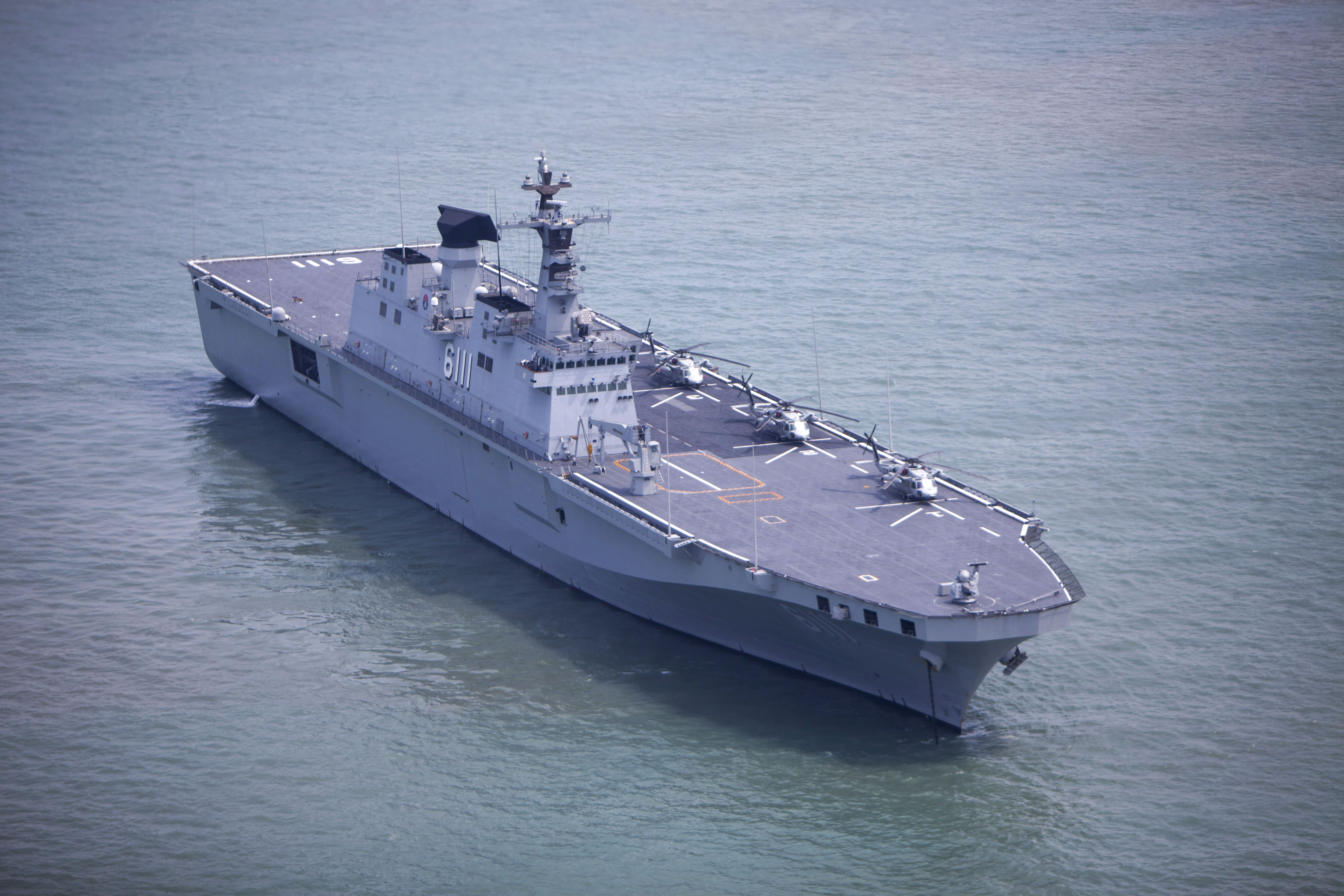 South Korea's amphibious ship Dokdo sits at anchor at the site of the ...