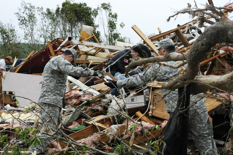 Arkansas Guardsmen assist a family with salvaging precious heirlooms ...
