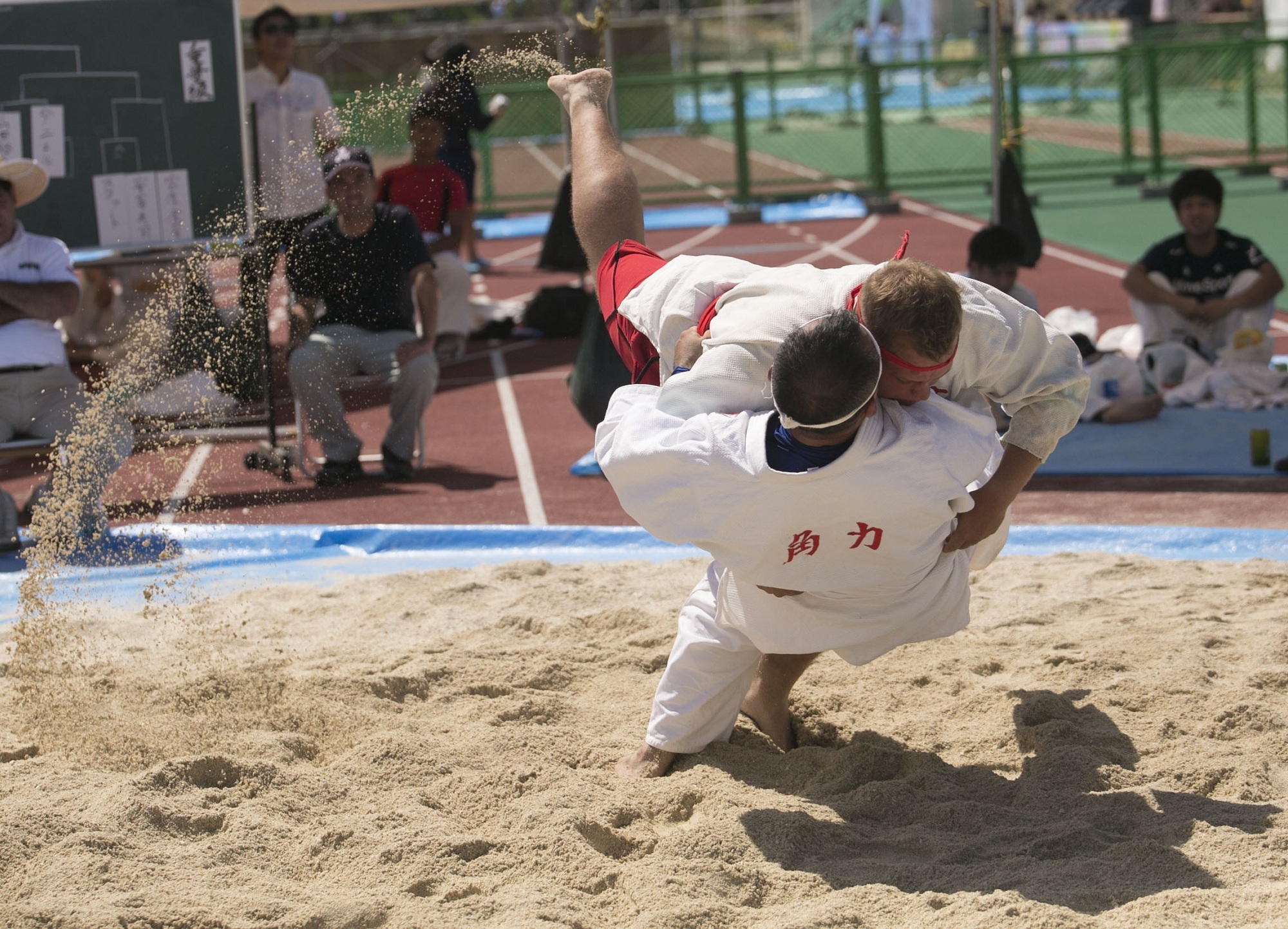 Marines take to sand during Okinawa sumo tournament