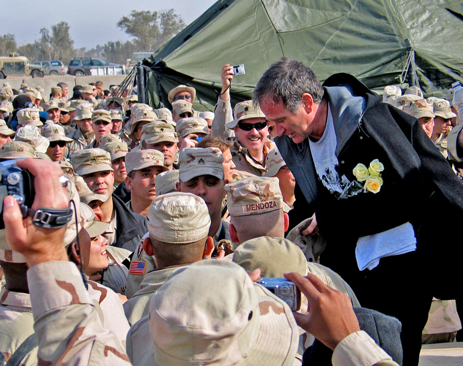 Comedian Robin Williams talks with U.S. soldiers during a USO tour on ...
