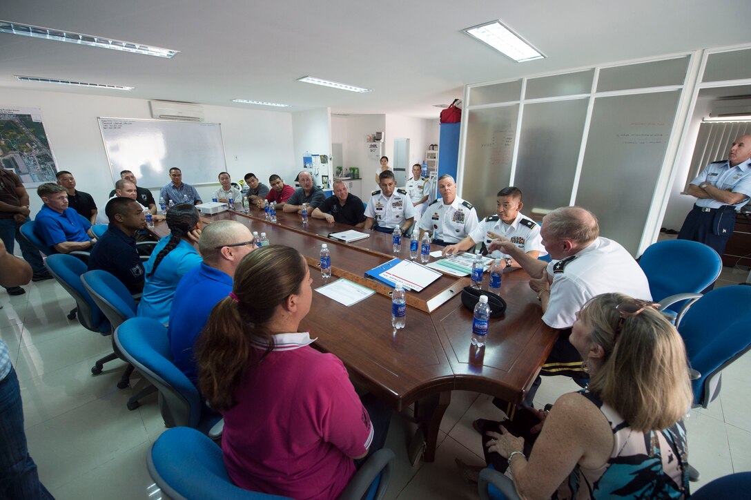 Members of the Joint Prisoner of War/Missing In Action Command team ...