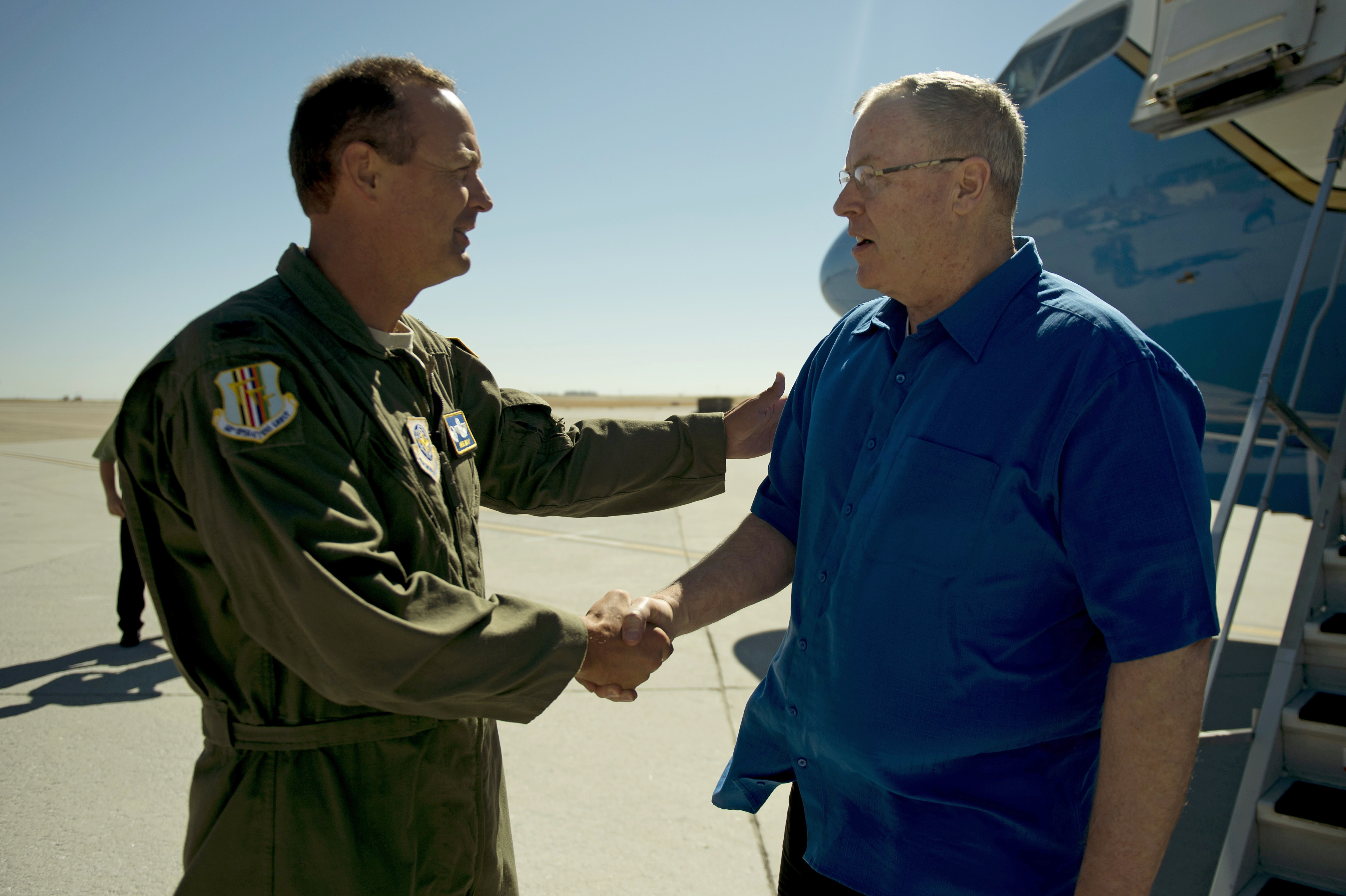 Deputy Defense Secretary Bob Work, right, speaks with Air Force Col ...