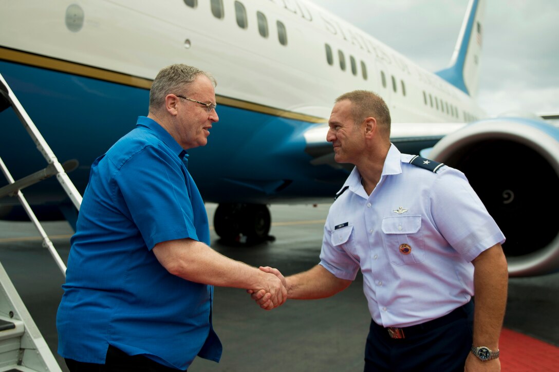 Deputy Defense Secretary Bob Work, left, speaks with Air Force Brig ...