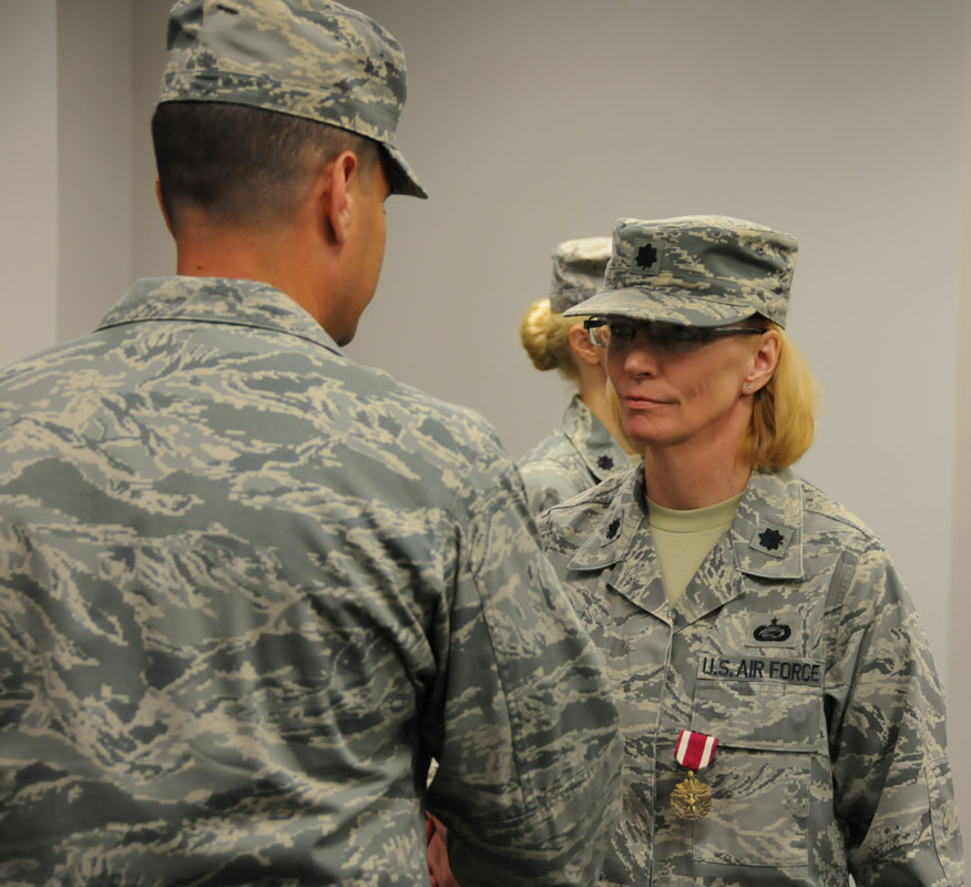 Lt. Col. Toni Lord receives a meritorious service medal