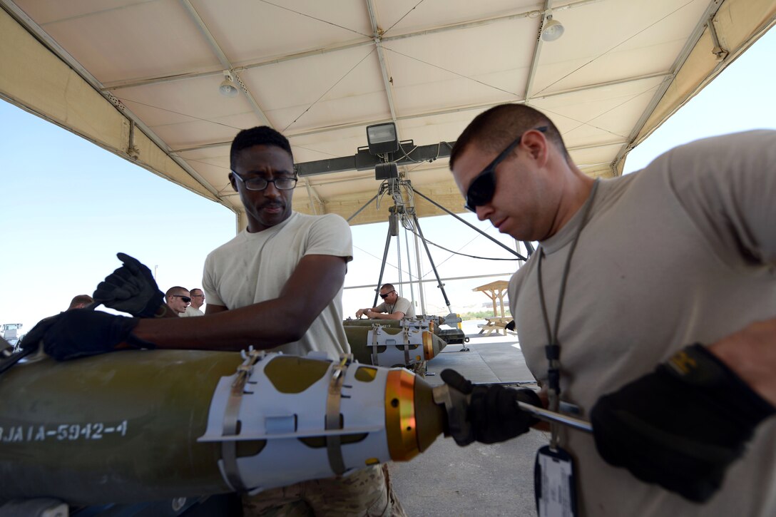 U.S. Air Force Staff Sgt. Terrin Love and U.S. Air Force Senior Airman ...