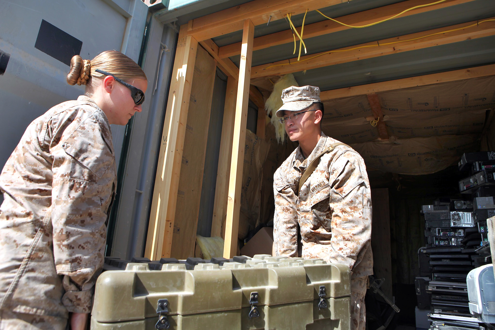 U.S. Marine Corps Sgt. Andrea Robb, left, and U.S. Marine Corps Cpl ...