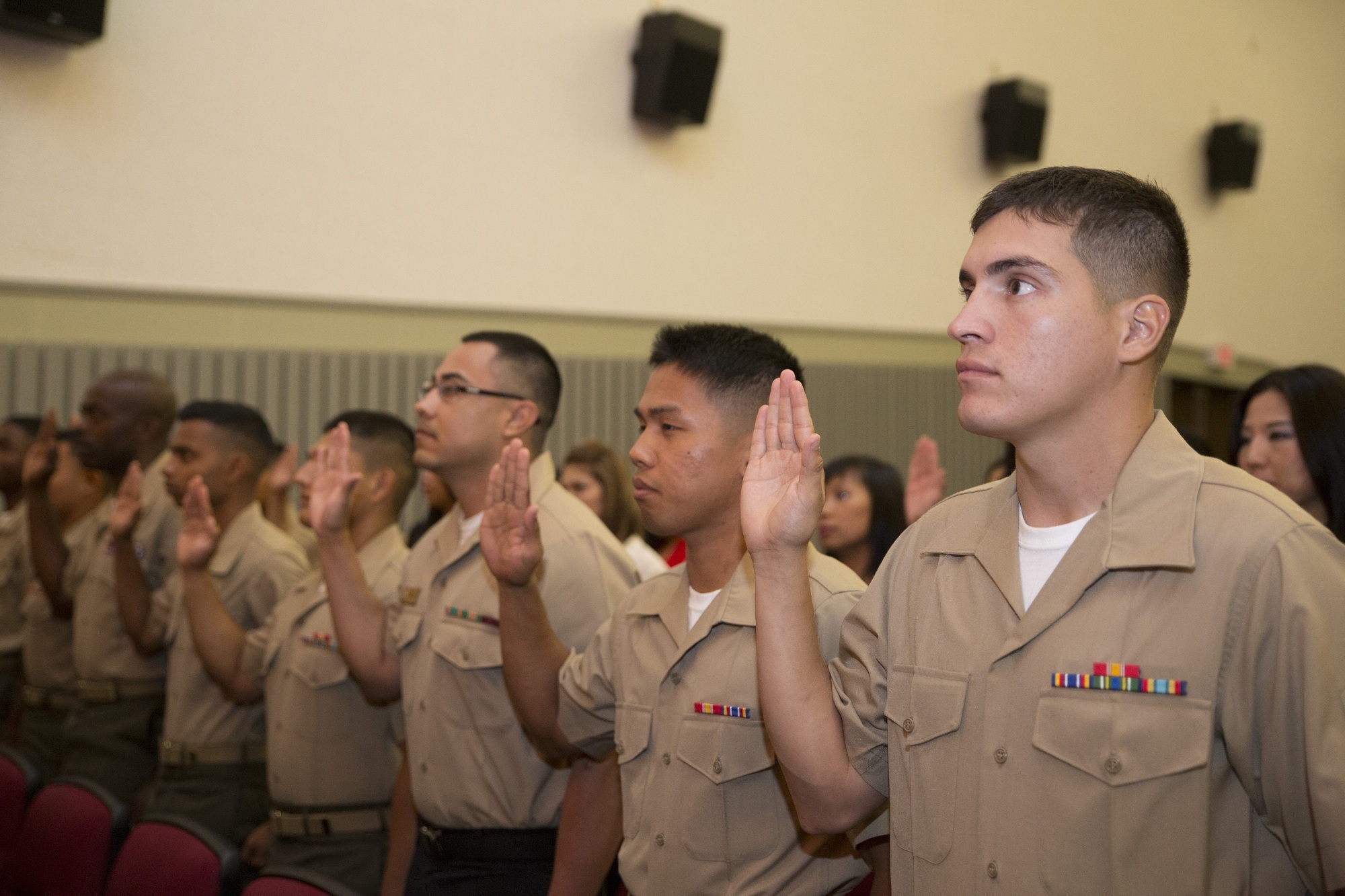 Raise your right hand: Service members, dependents swear Oath of Allegiance