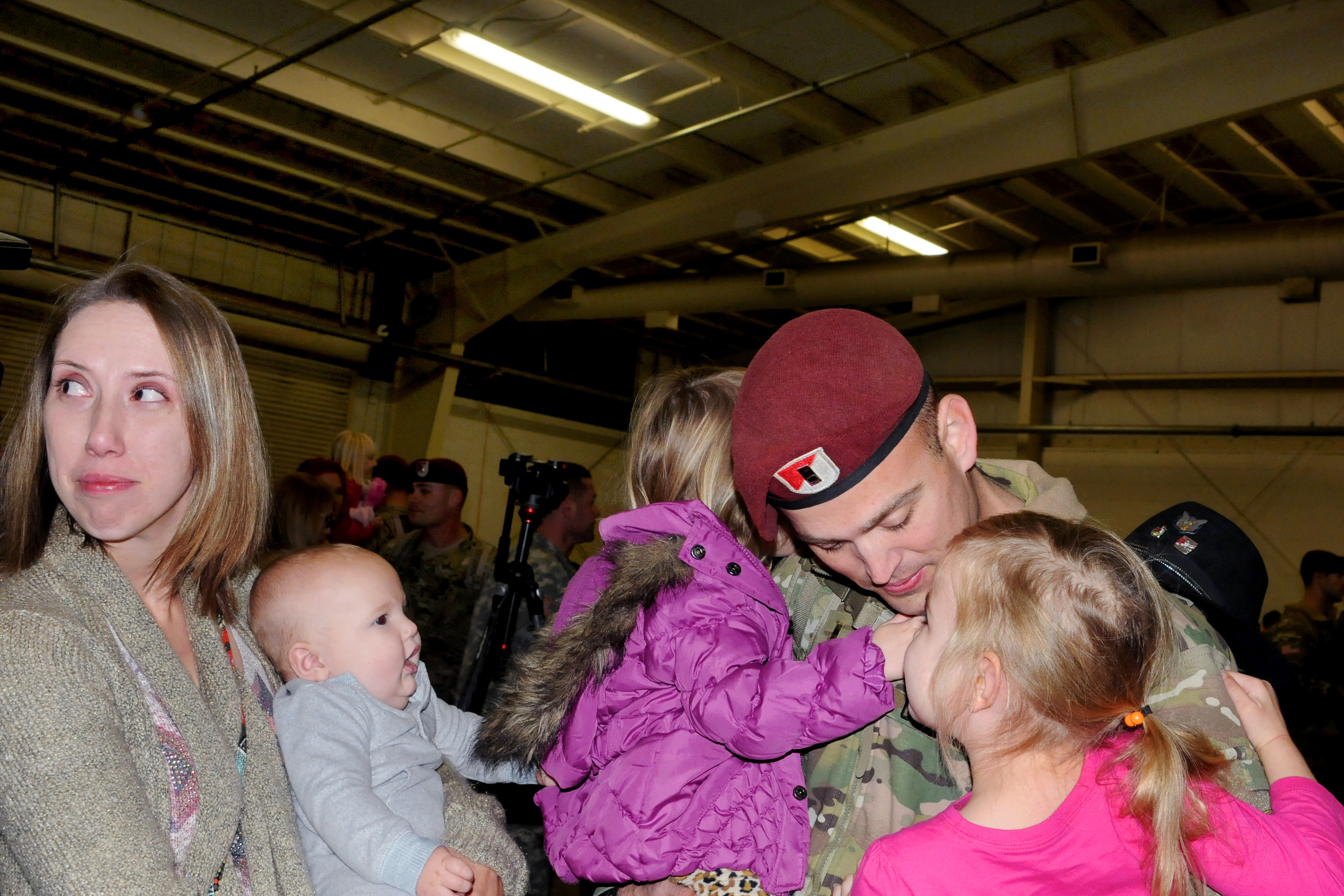 Army Chief Warrant Officer 2 Ryan Basso is reunited with his wife ...