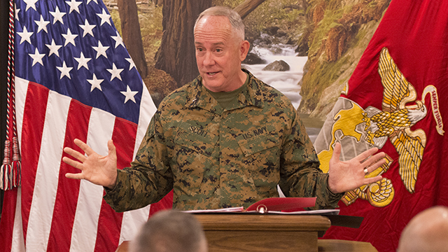 Rear Adm. Scott speaks to Chaplain Capodanno's medal