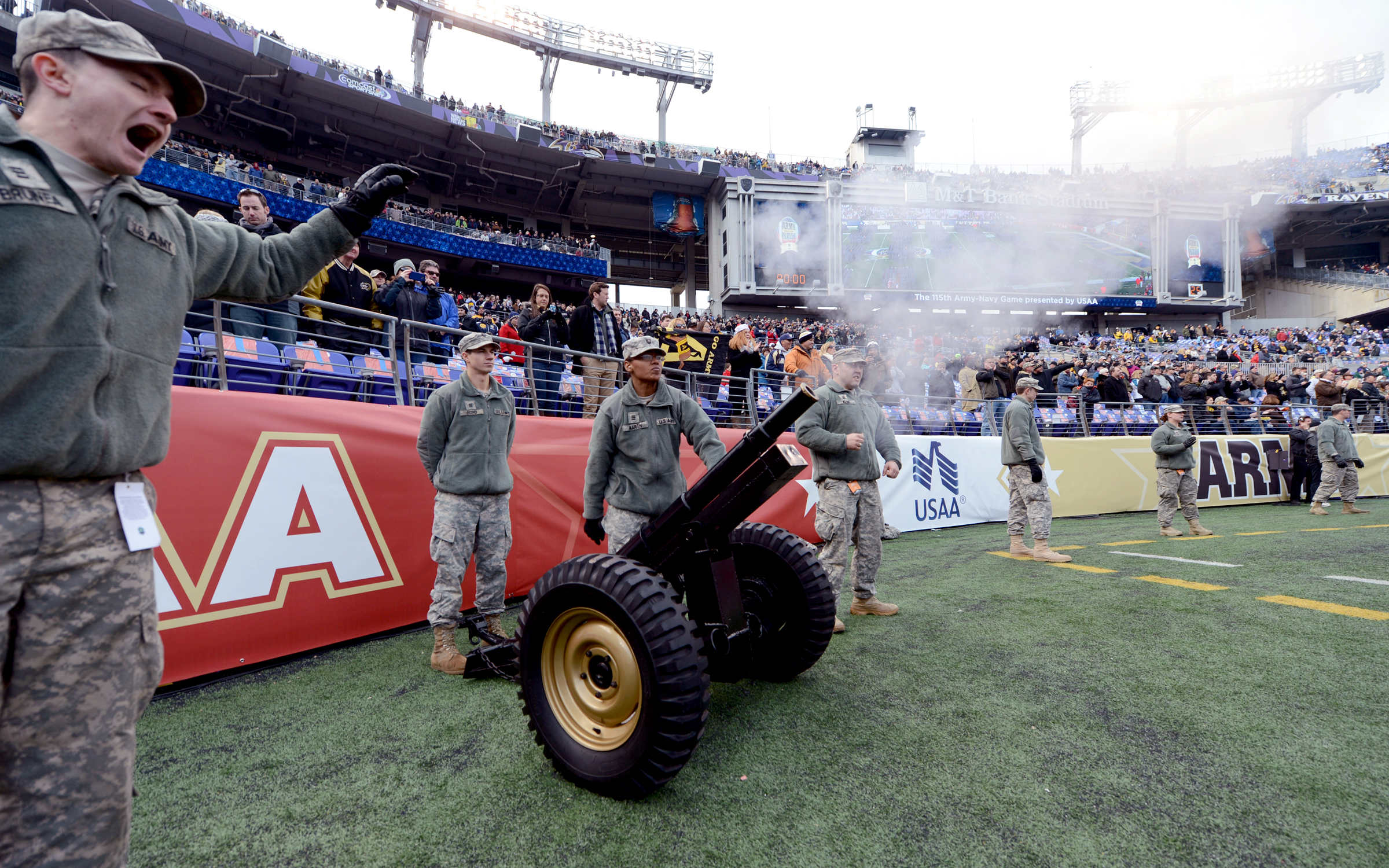 U.S. Military Academy cadet Luke Brunea gives the command while Cadet ...