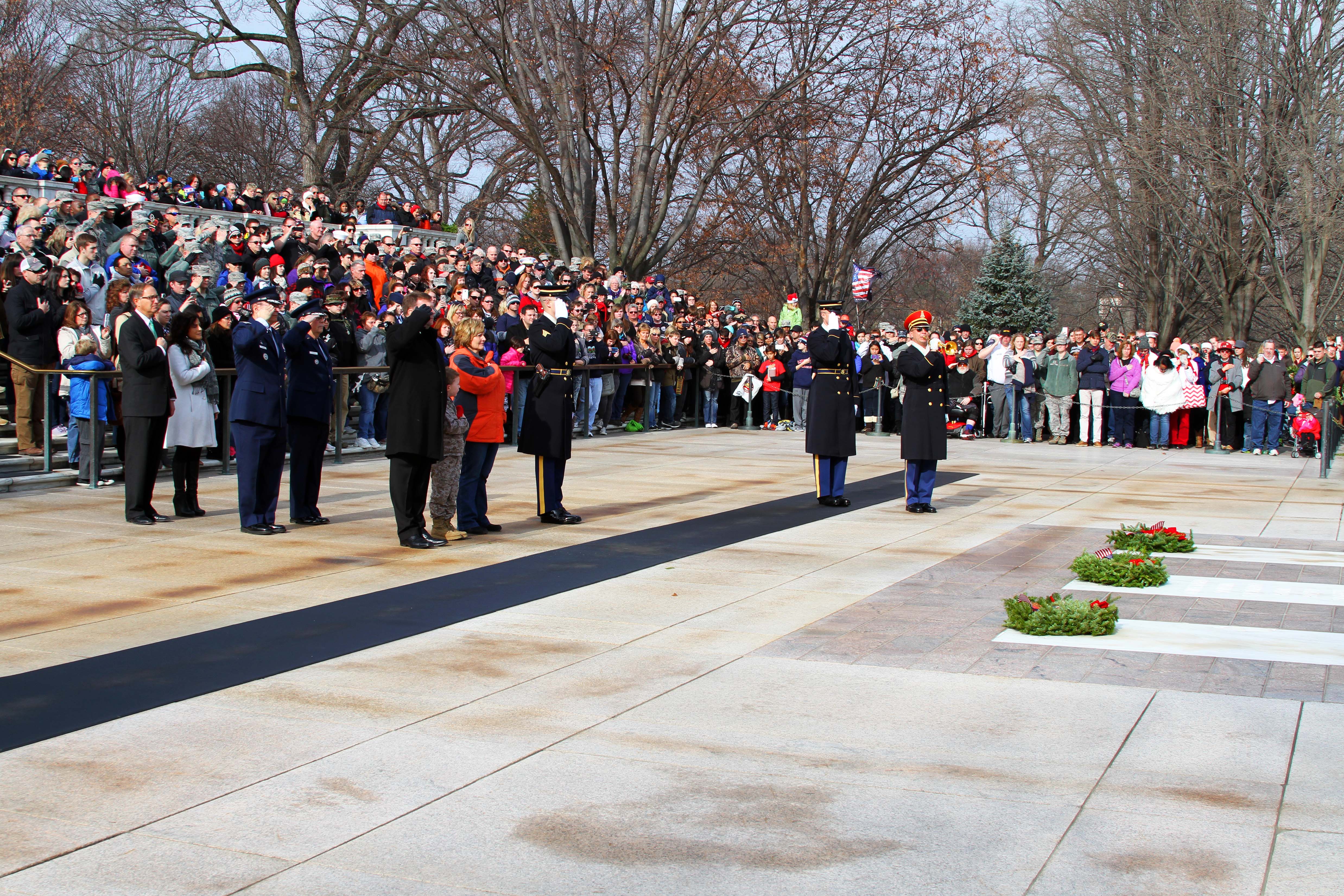 Ann LePage, center, wife of Maine Governor Paul LePage, service members ...