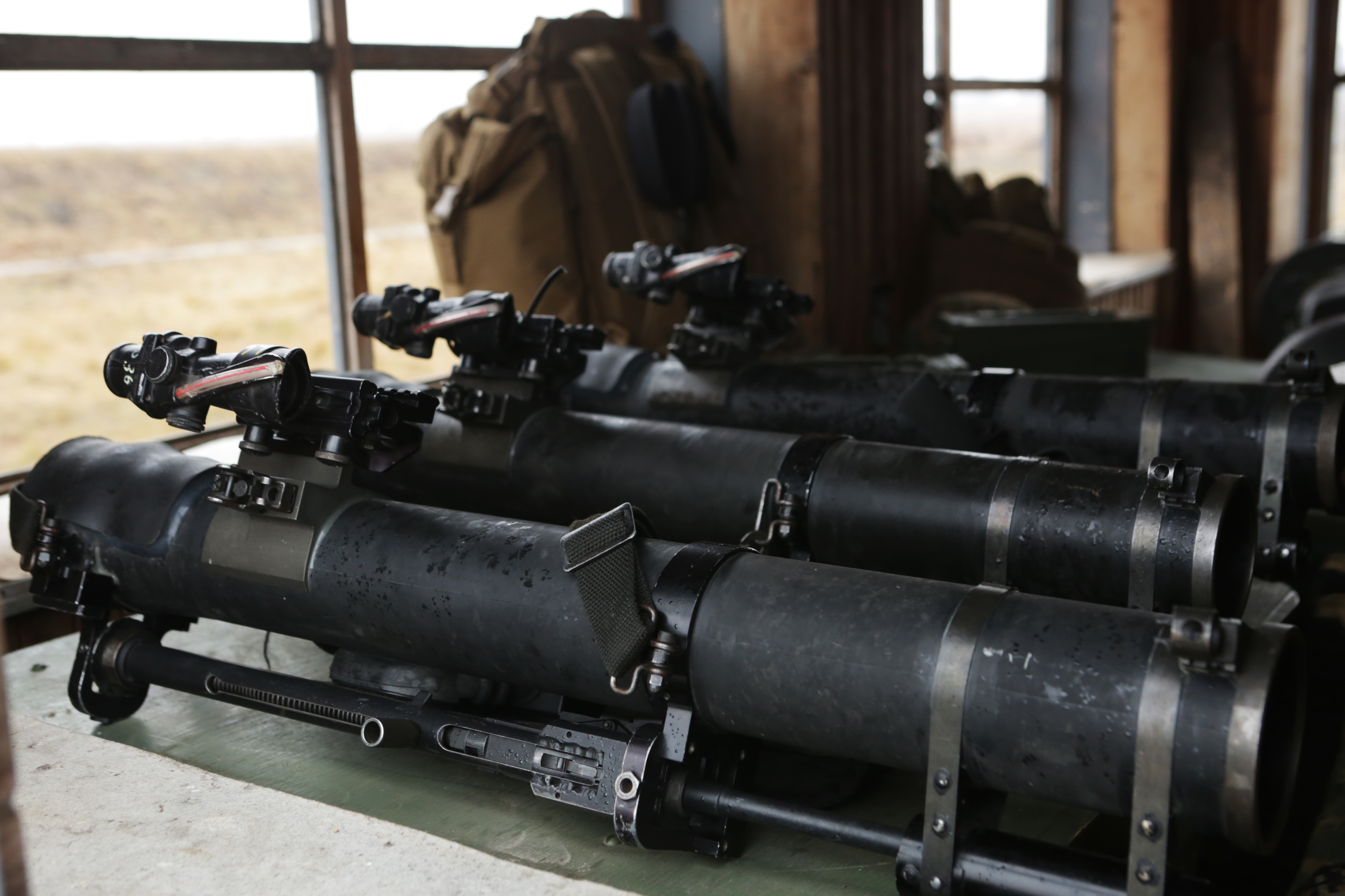 Shoulder-launched multipurpose assault weapons are secured before an ...