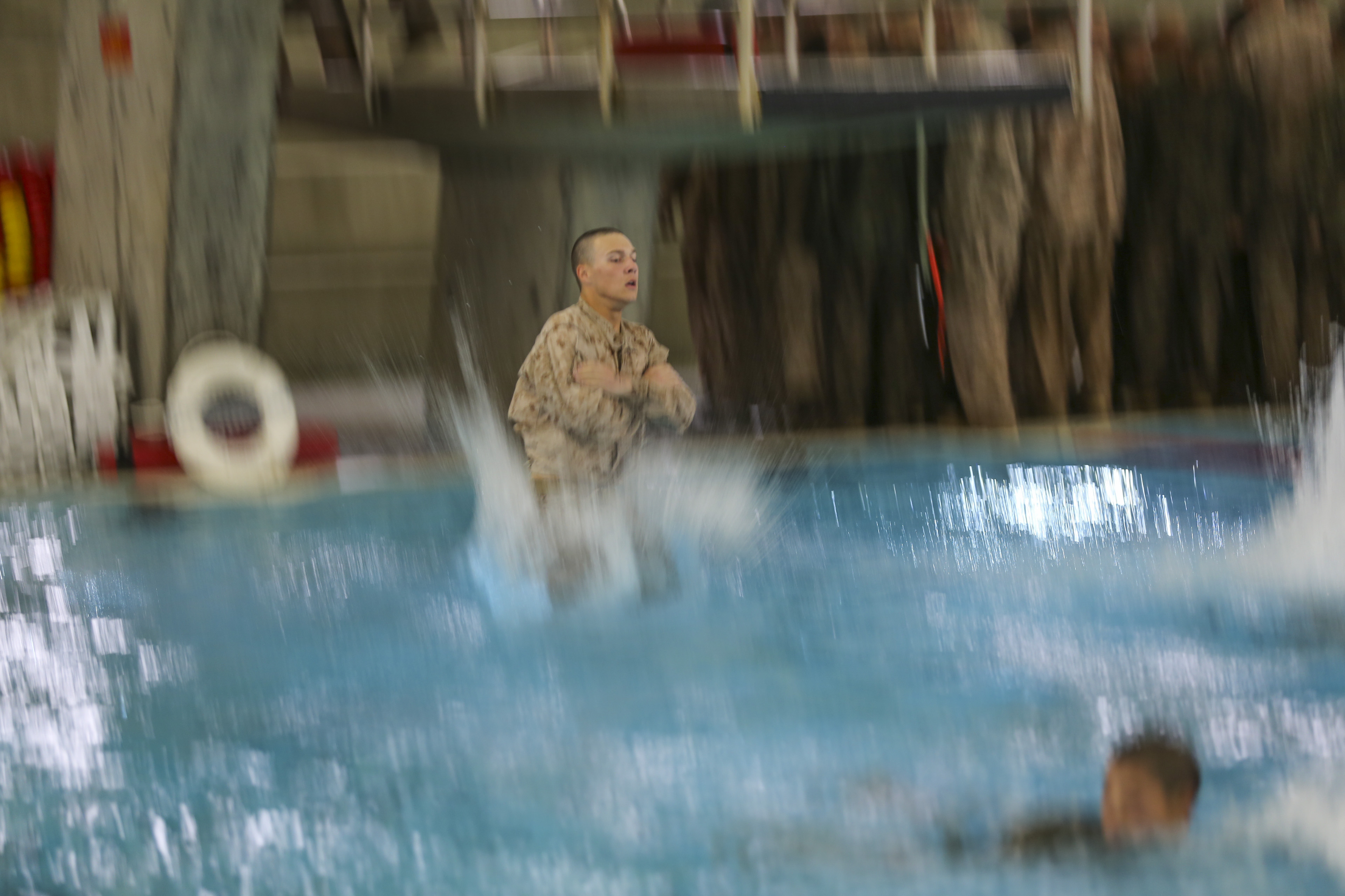 Co. B plunges into water survival skills training