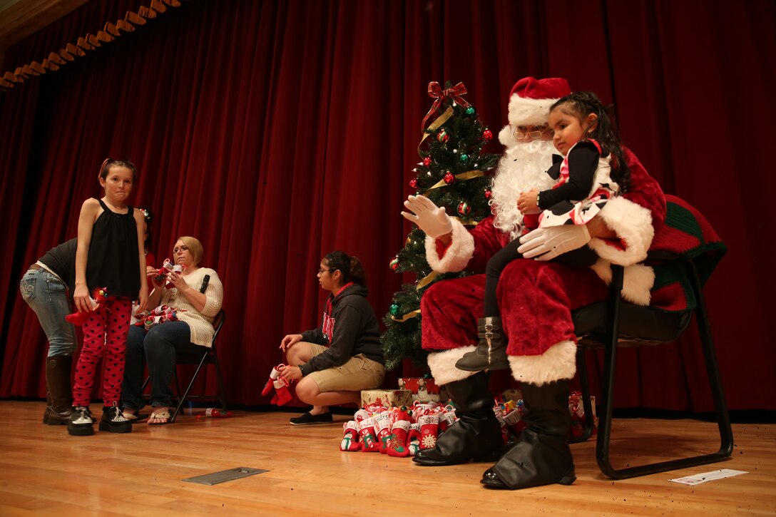 Santa brings food, fun to families on Camp Foster