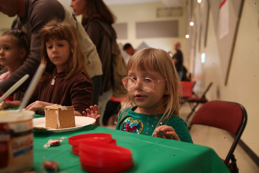 Santa brings food, fun to families on Camp Foster