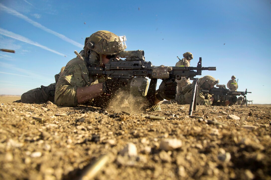 Army Rangers fire on an objective during Task Force training on Camp ...