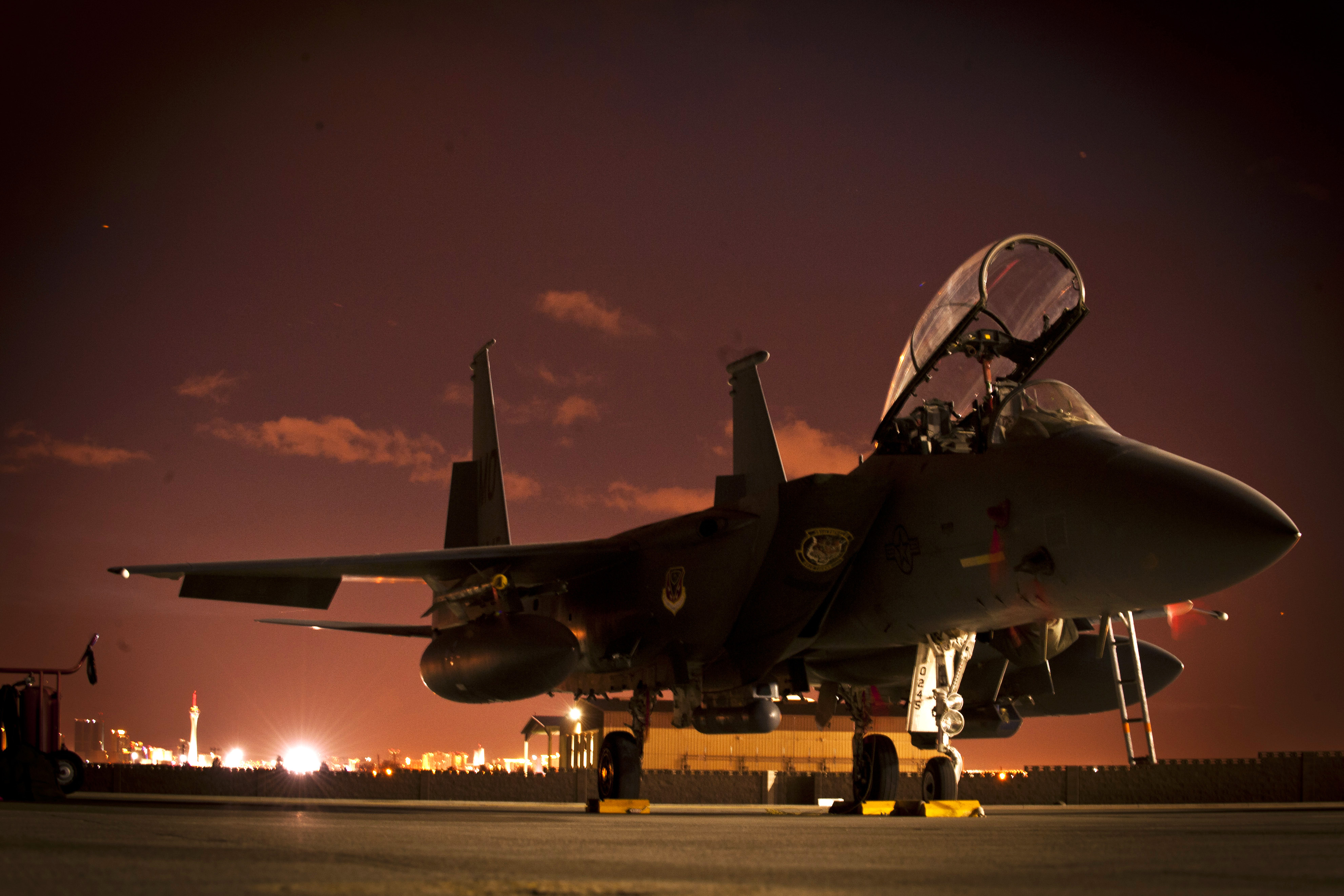 A U.S. Air Force F-15E Strike Eagle sits on the flightline before a ...