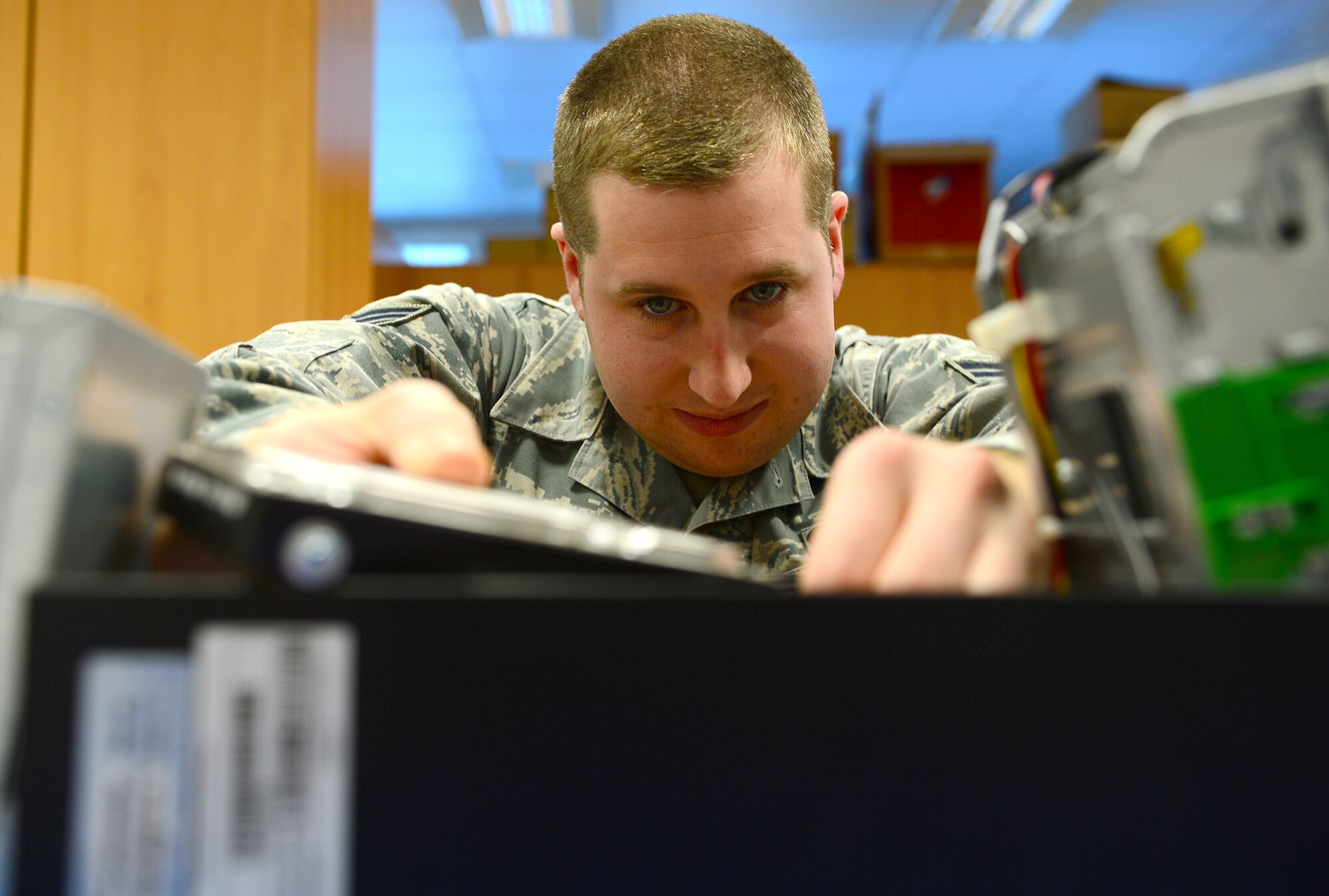 Client systems technician displays 'Excellence In All We Do' > Royal ...