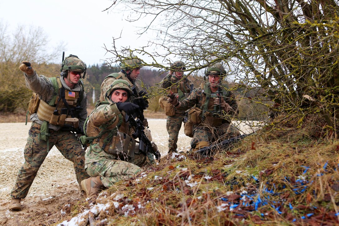 U.S. Marines and Georgian soldiers coordinate the next movements to ...