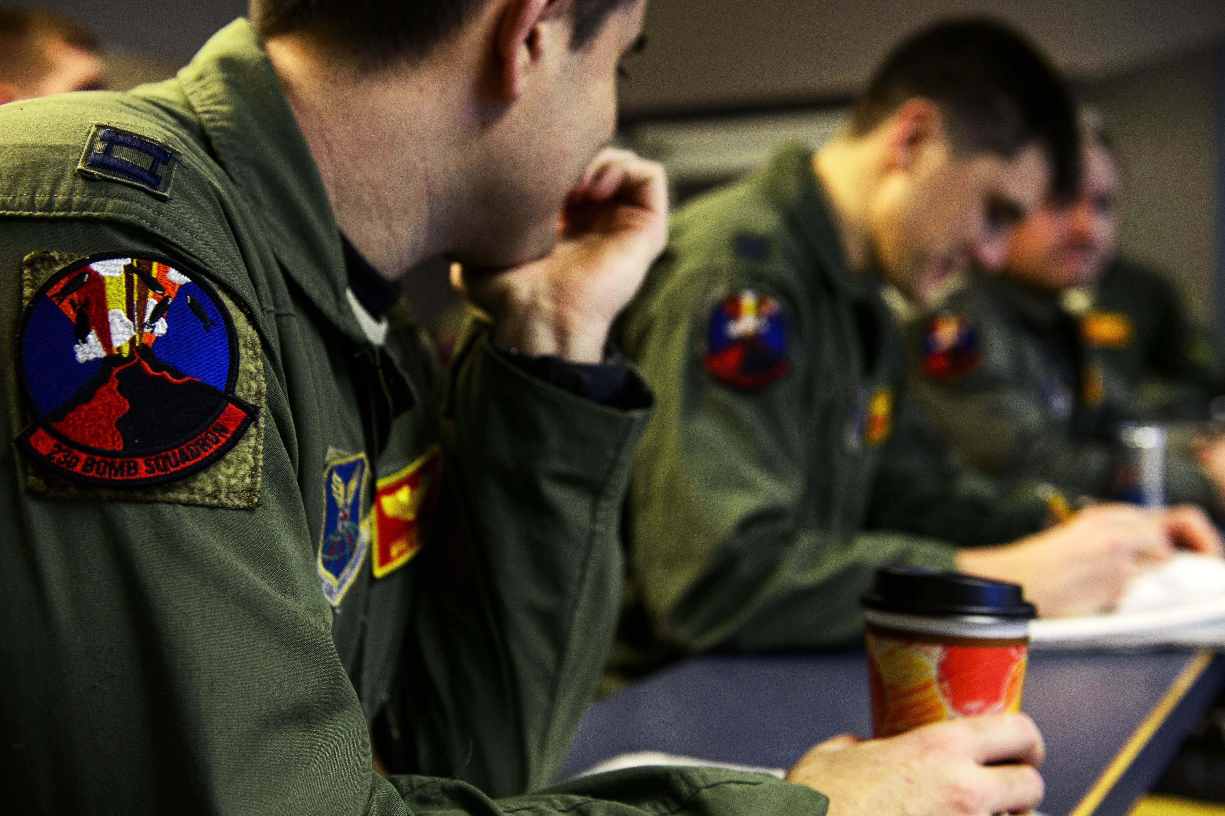 Air Force Capts. Mike Devita, foreground, and Austin Fouts conduct a ...