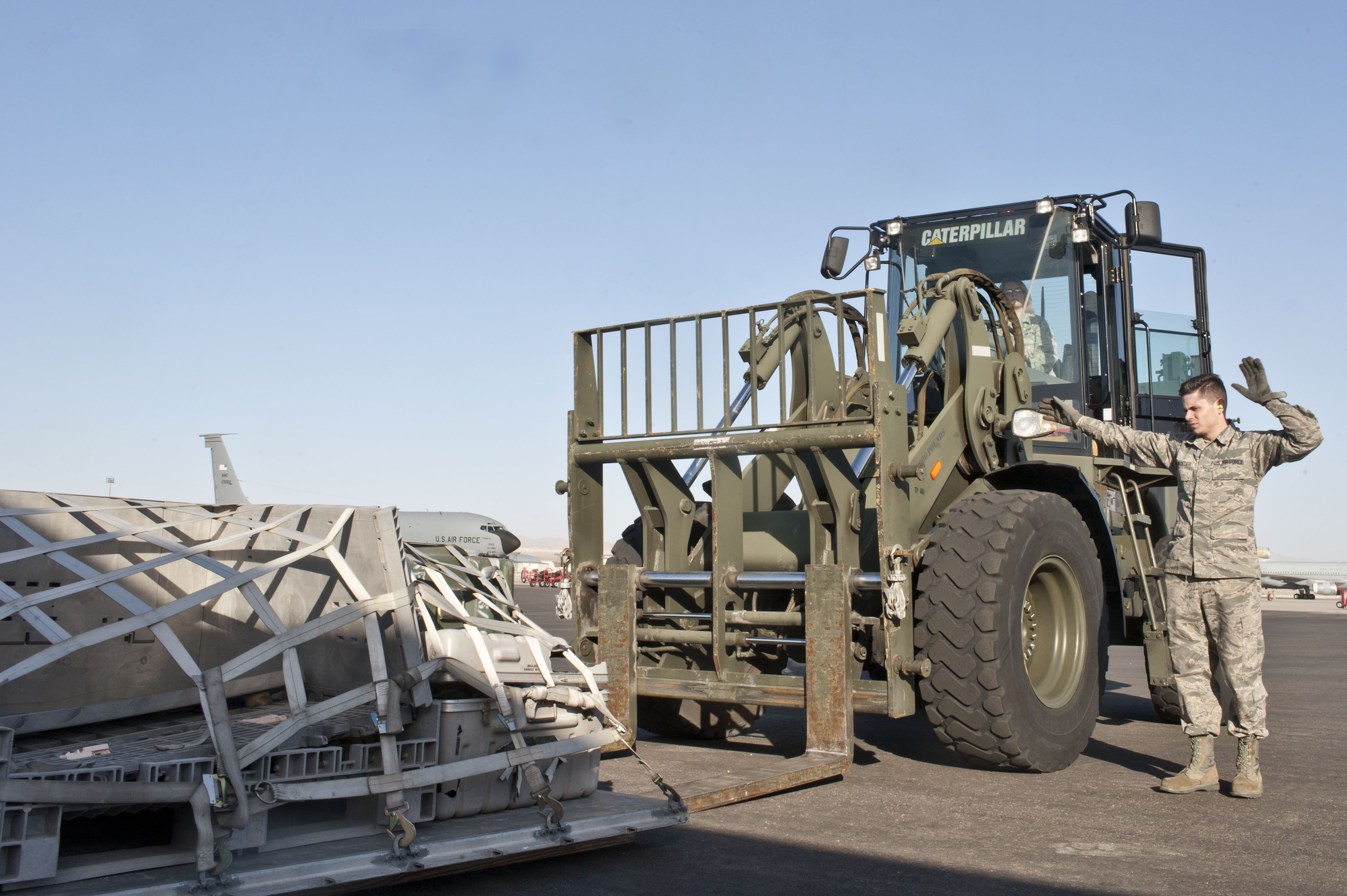 Air terminal Airmen move essential supplies > Nellis Air Force Base ...