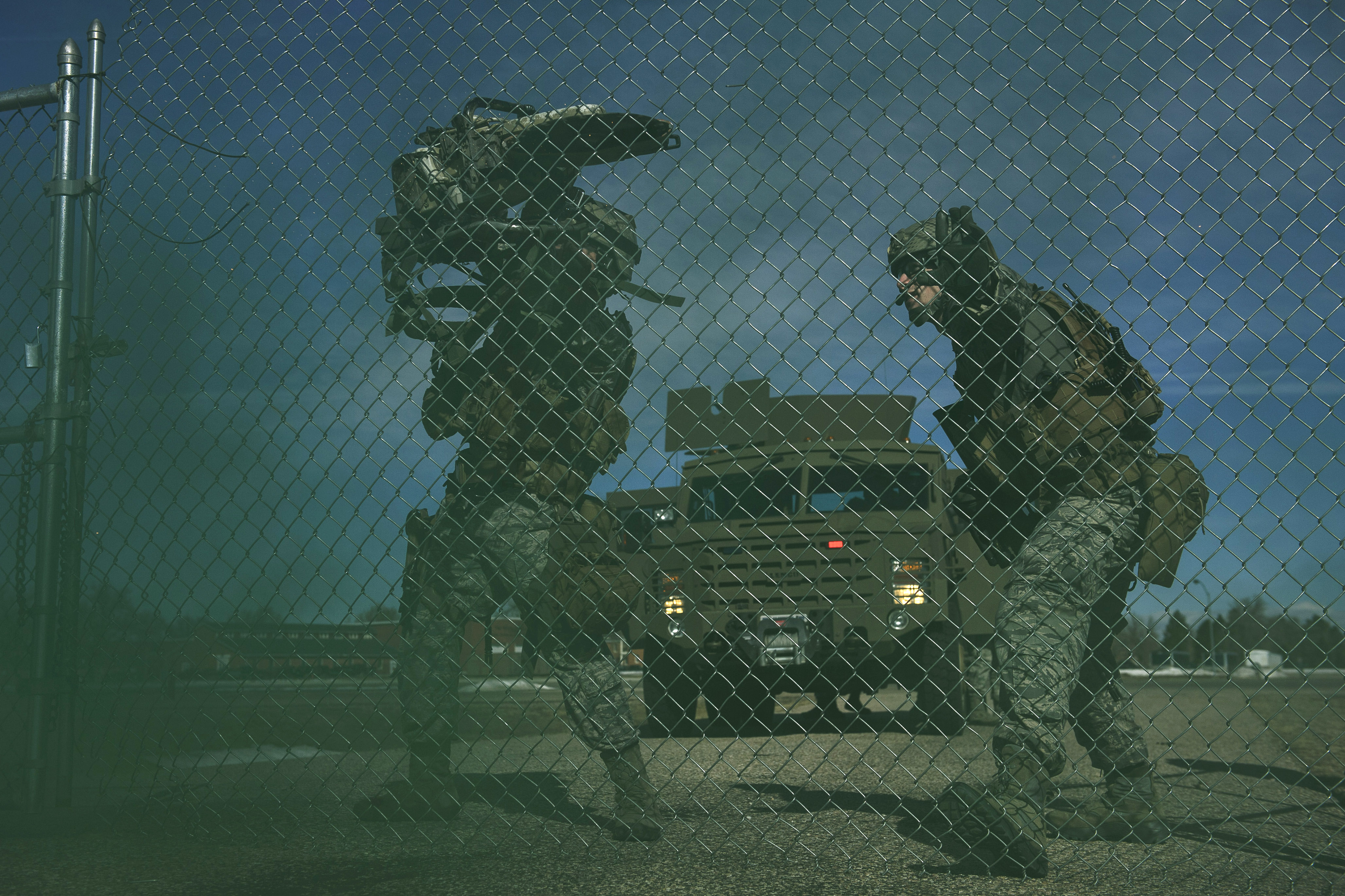 Air Force Senior Airmen James Marcum and Craig Eveland uses a K-12 saw ...