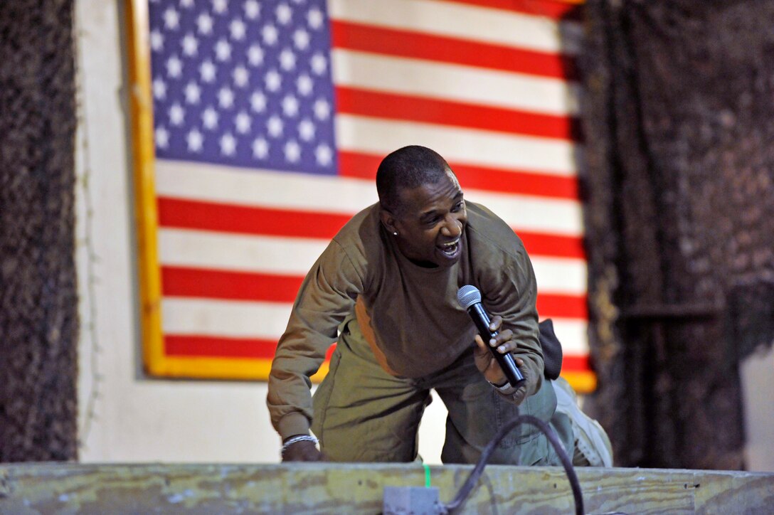 Comedian Tommy Davidson performs a New Year's eve comedy routine on ...