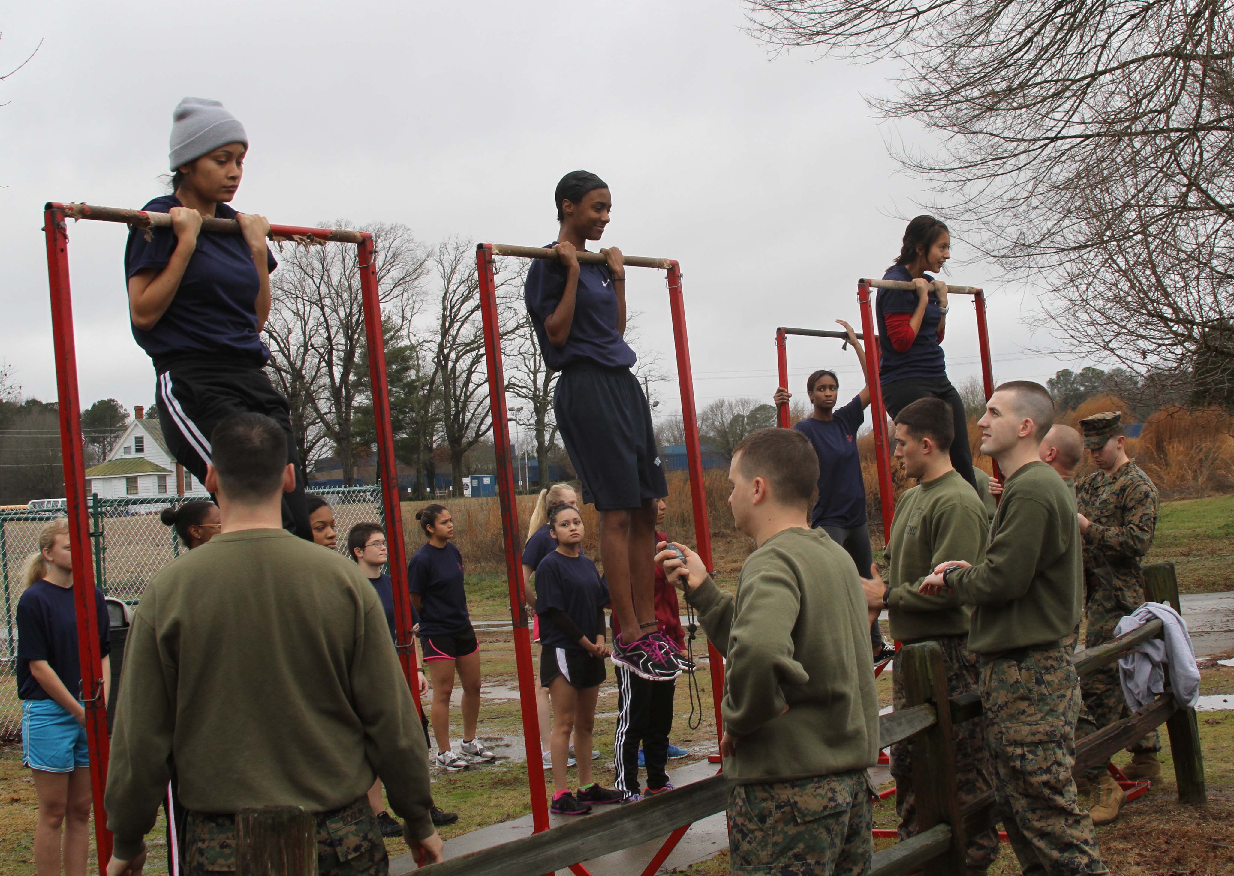 Female poolees receive instruction from Parris Island Drill Instructors