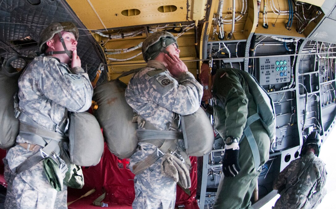 U.S. and Dutch paratroopers prepare for a joined forces airborne ...