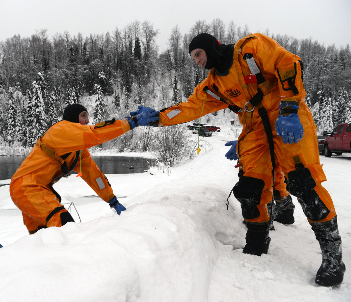 JBER 673d CES firefighters conduct annual ice water rescue training