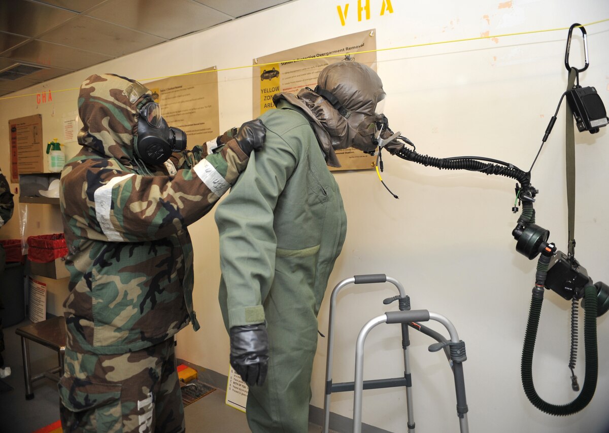 Photos: AFE helps 25th FS suit up for CBRN exercise > Osan Air Base > Article Display