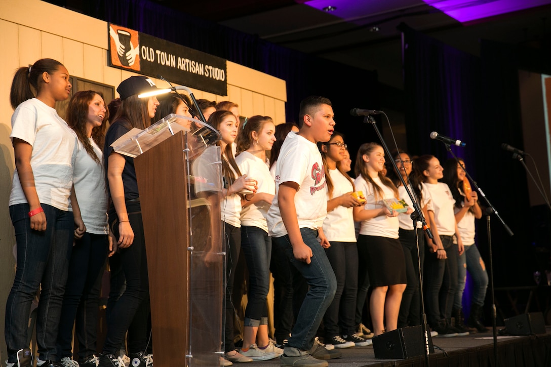 Marines present item during Hearts for Art Gala