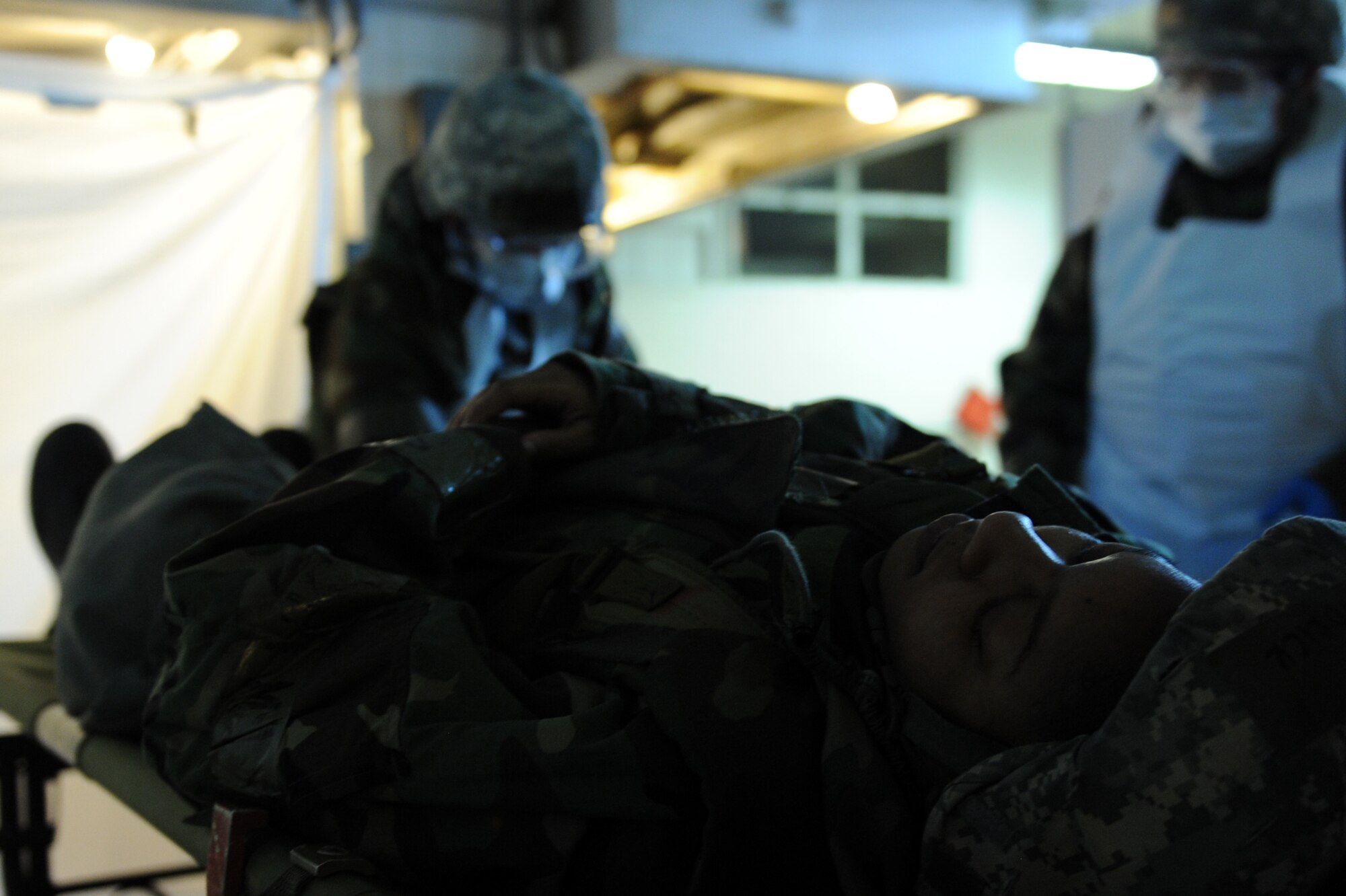 Mortuary affairs processes simulated casualties during MFE > Kadena Air ...