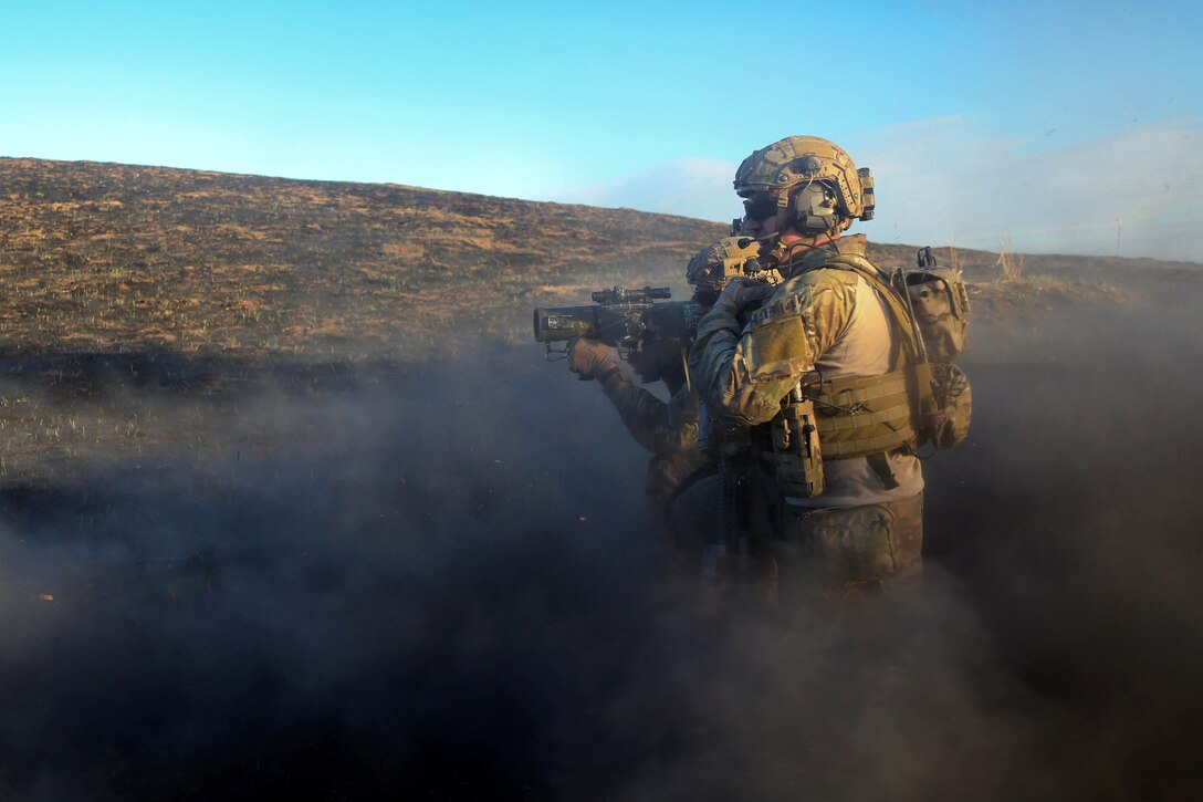 Army Rangers fire a recoilless rifle during training on Fort Hunter ...