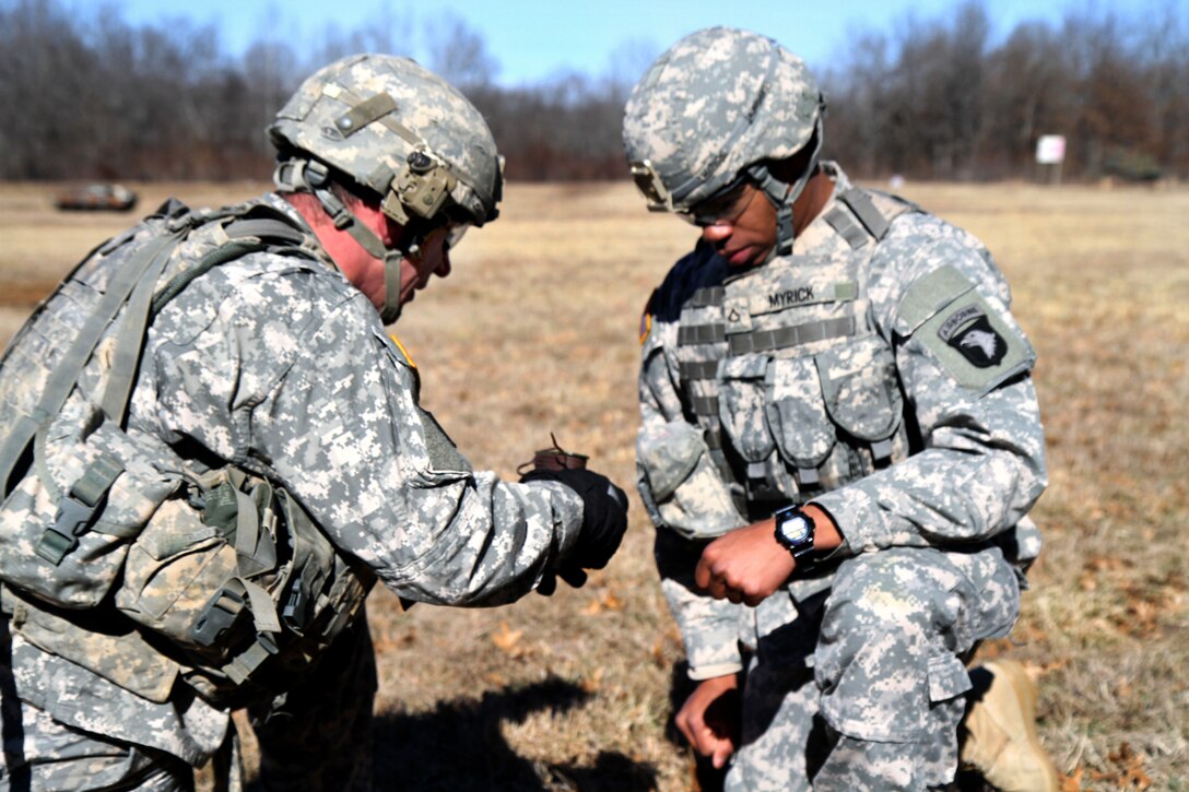 Army Sgt. Christopher Bidwell, left, and Army Pvt. James Myrick ...