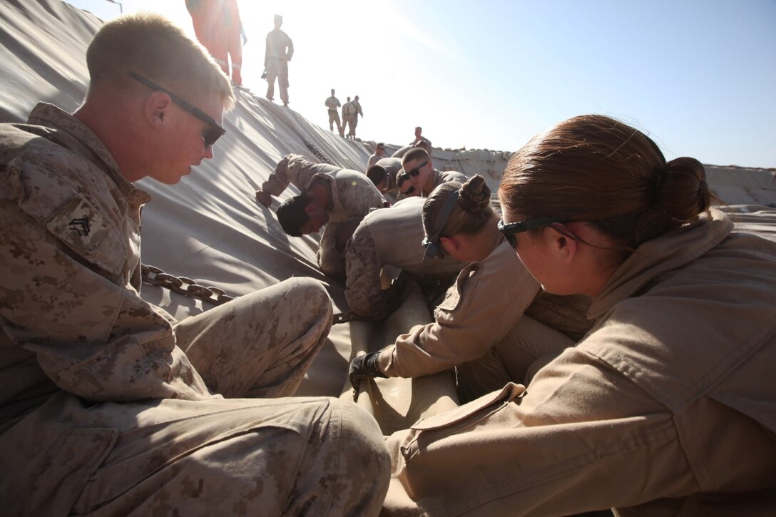 Marine Wing Support Squadron 274 Marines finish bulk fuel bladder ...