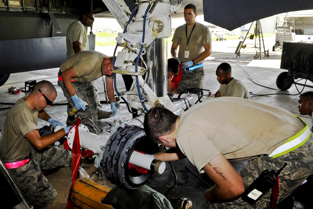 U.S. Air Force crew members service a KC-135 Stratotanker on Kadena Air ...