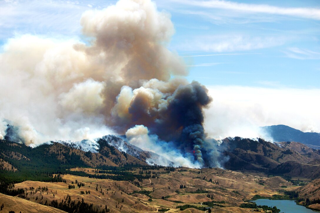 The Carlton Complex fire burns near Winthrop, Wash., July 18, 2014.