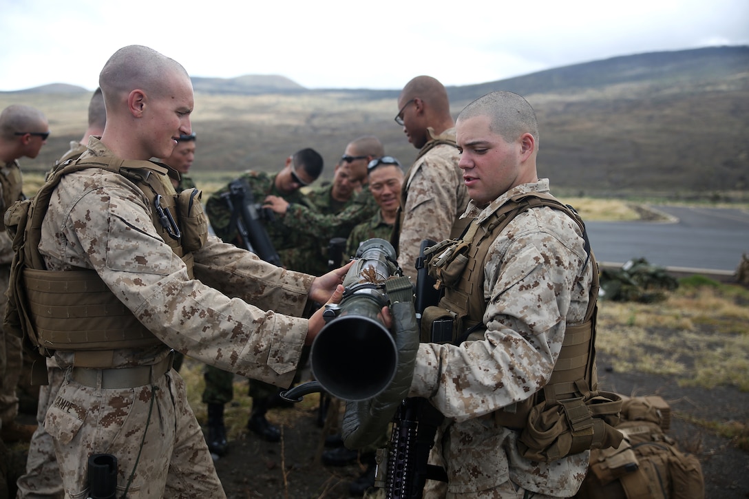 U.S. Marines unload gear at PTA