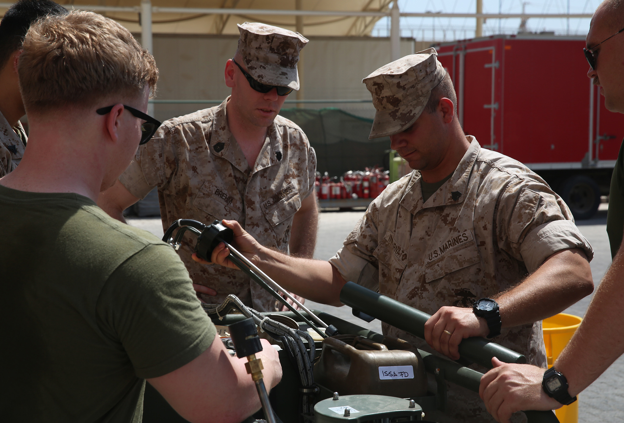 MEU CBRN Marines practice using decontamination system