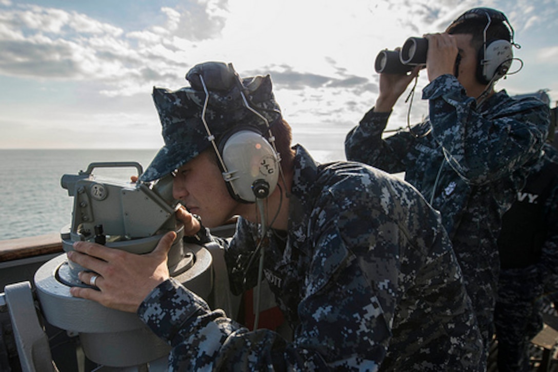 Navy Petty Officer 2nd Class Todd Marriott, left, and Petty Officer 3rd ...