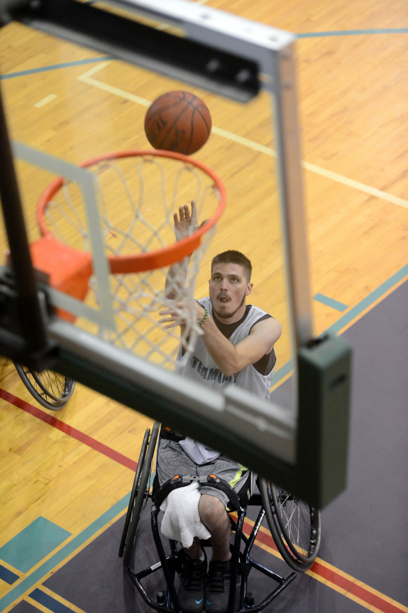 Navy Petty Officer 2nd Class Daniel Crossley puts up a shot during ...