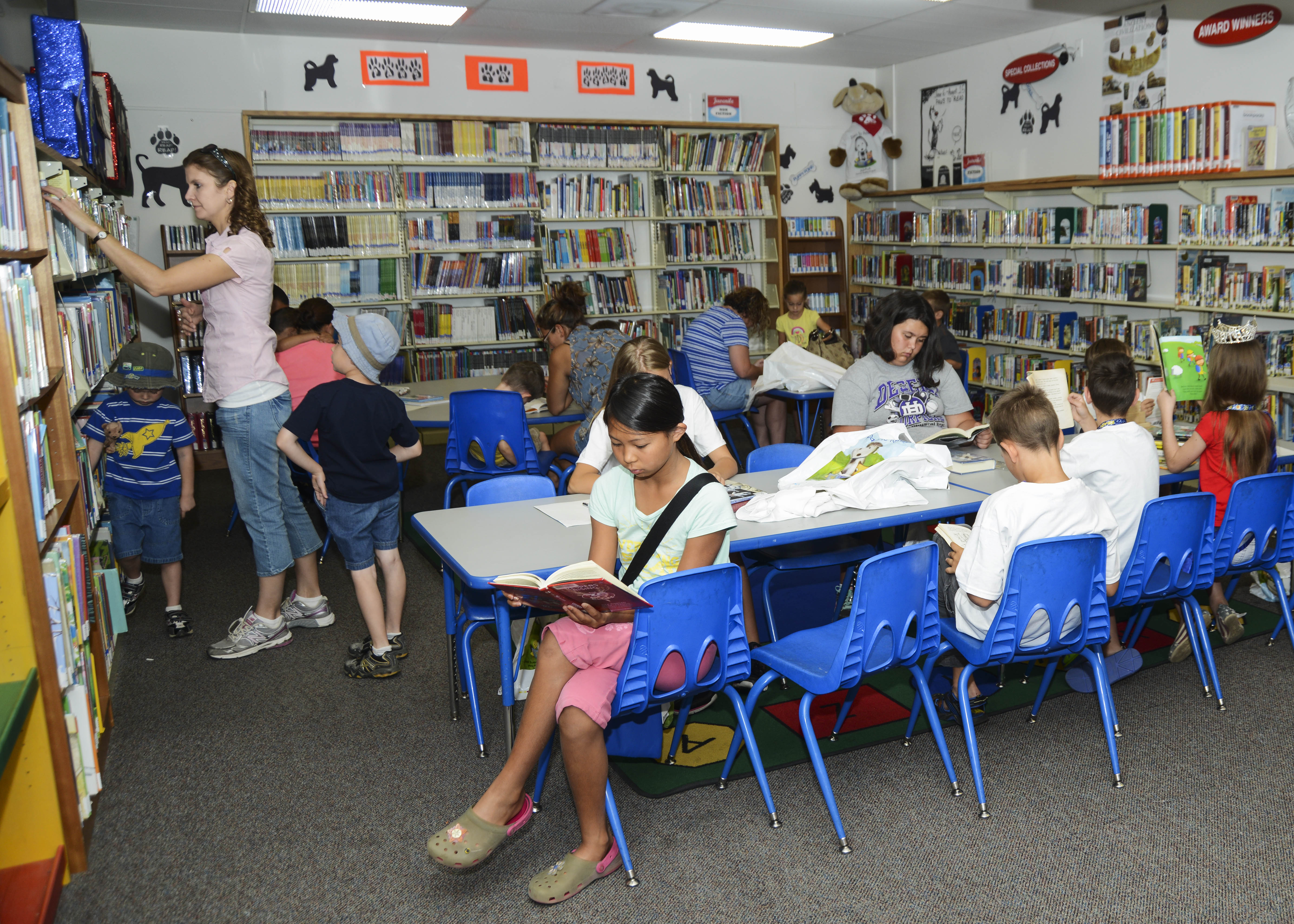 Fittingly, K-9 unit kicks off 'Paws to Read,' Summer Reading Program at ...